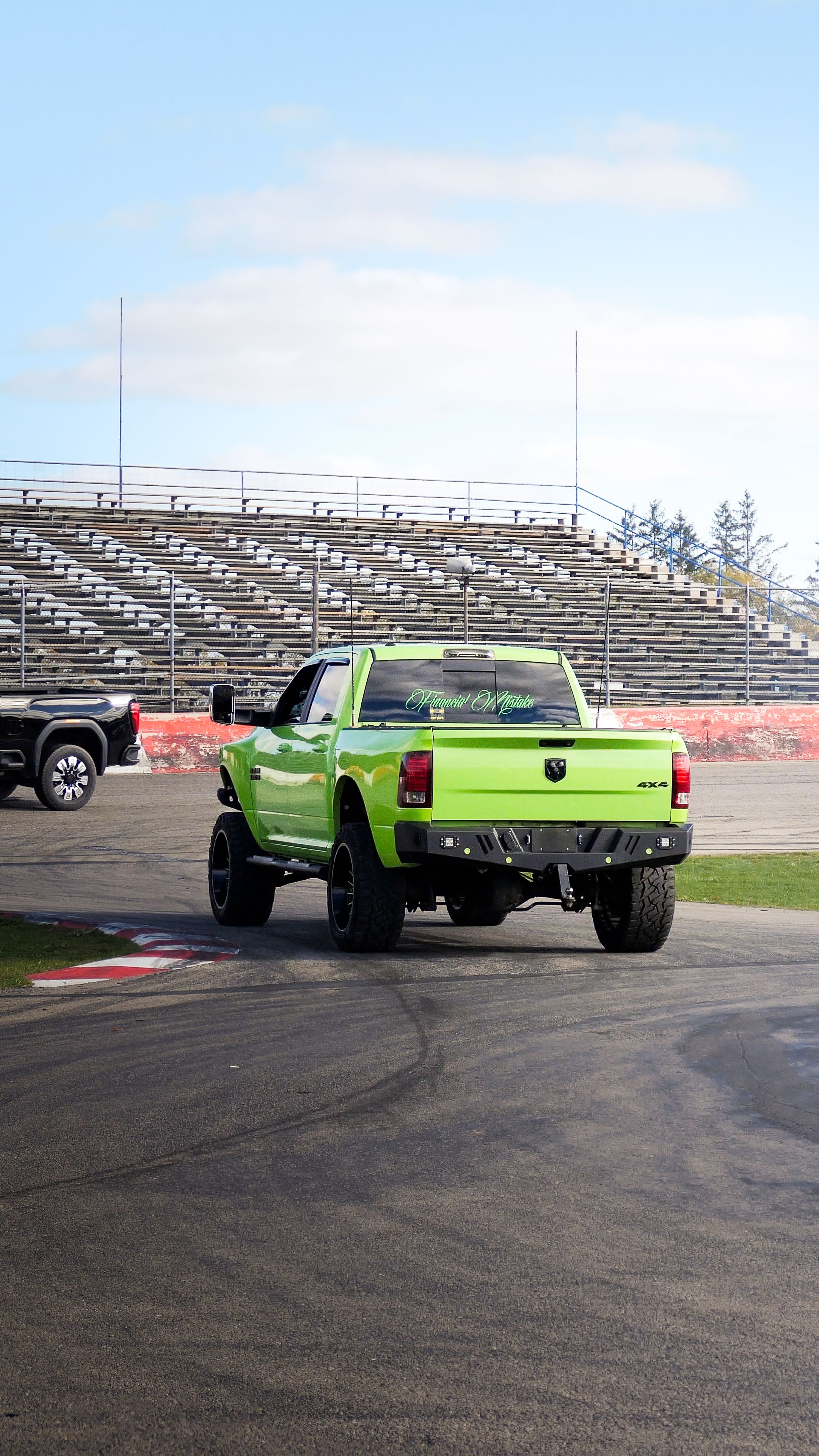 Green RAM 1500 at Racing Circuit · Free Stock Photo