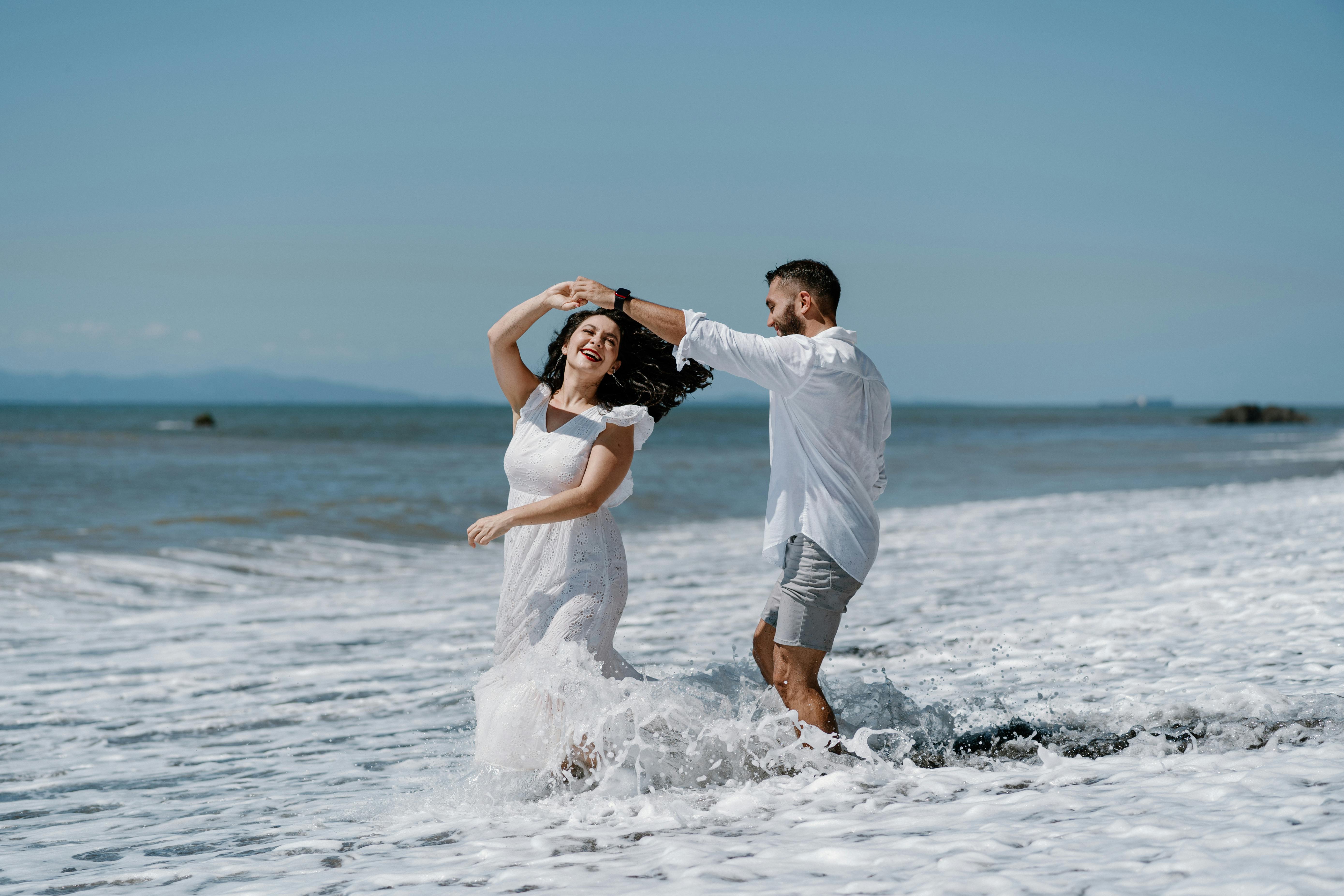A Couple Dancing in the Sea · Free Stock Photo
