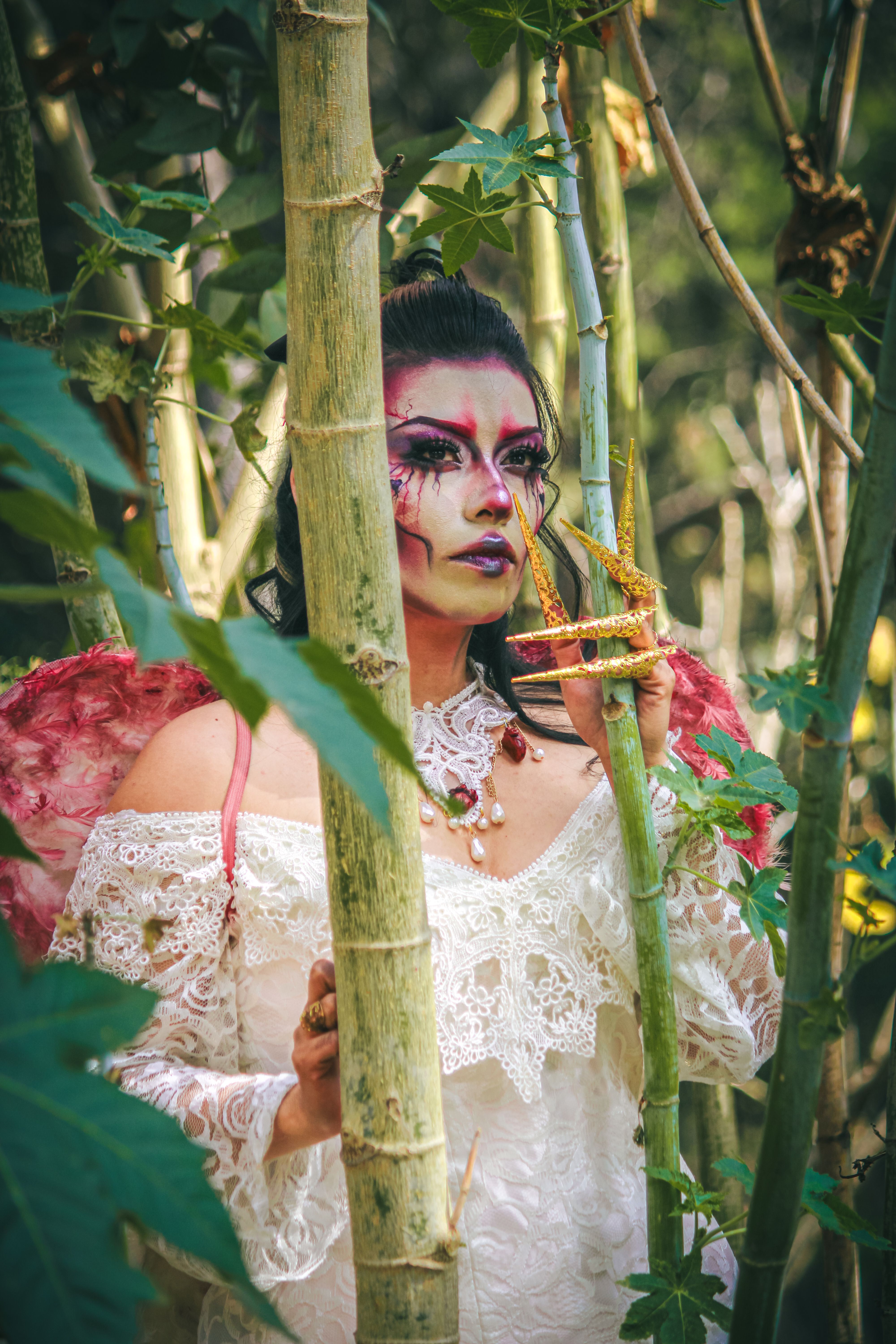 Portrait of Woman in Cosplay Costume among Bamboo Trees · Free Stock Photo