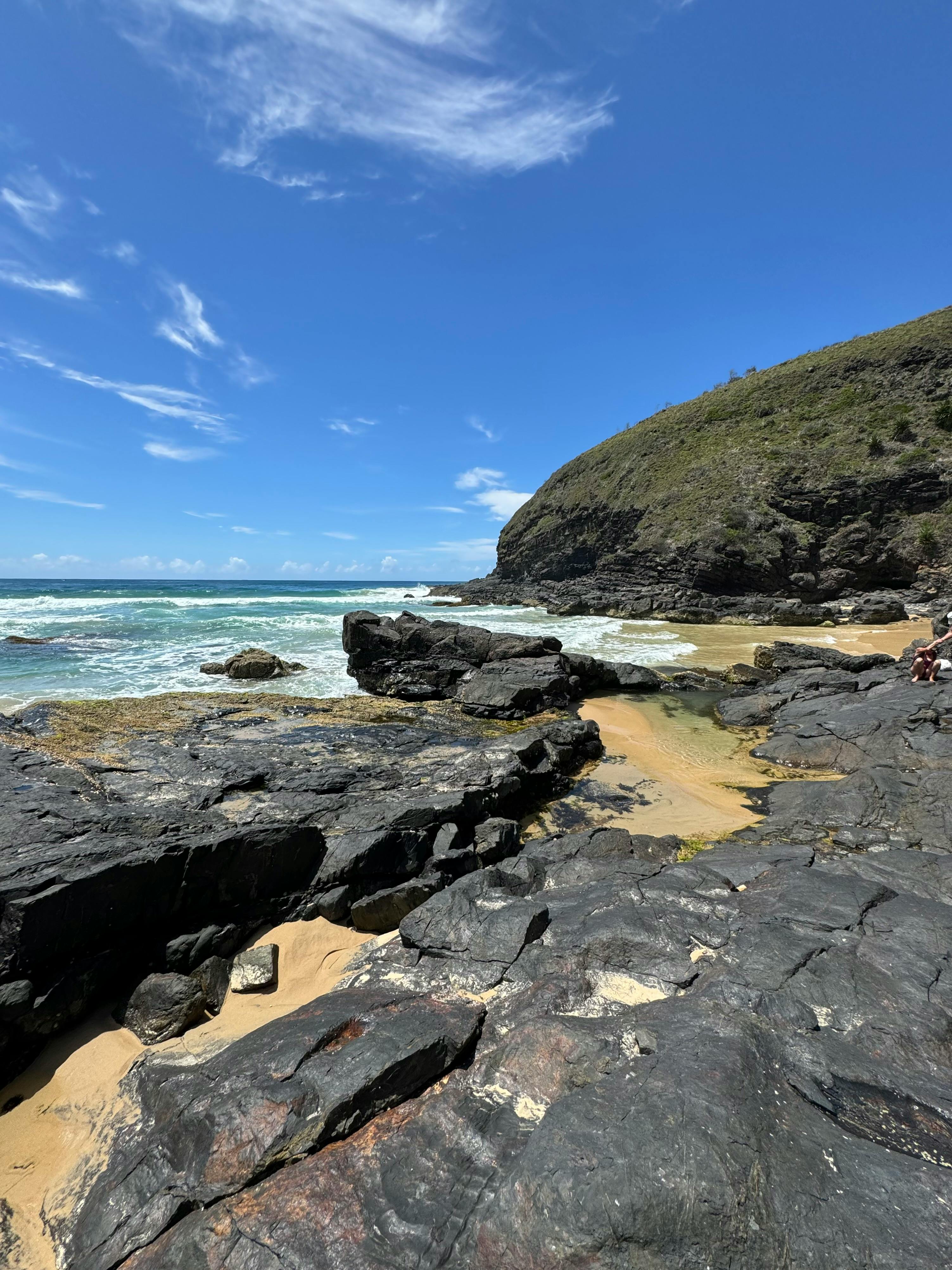Large Black Rocks on Beach · Free Stock Photo