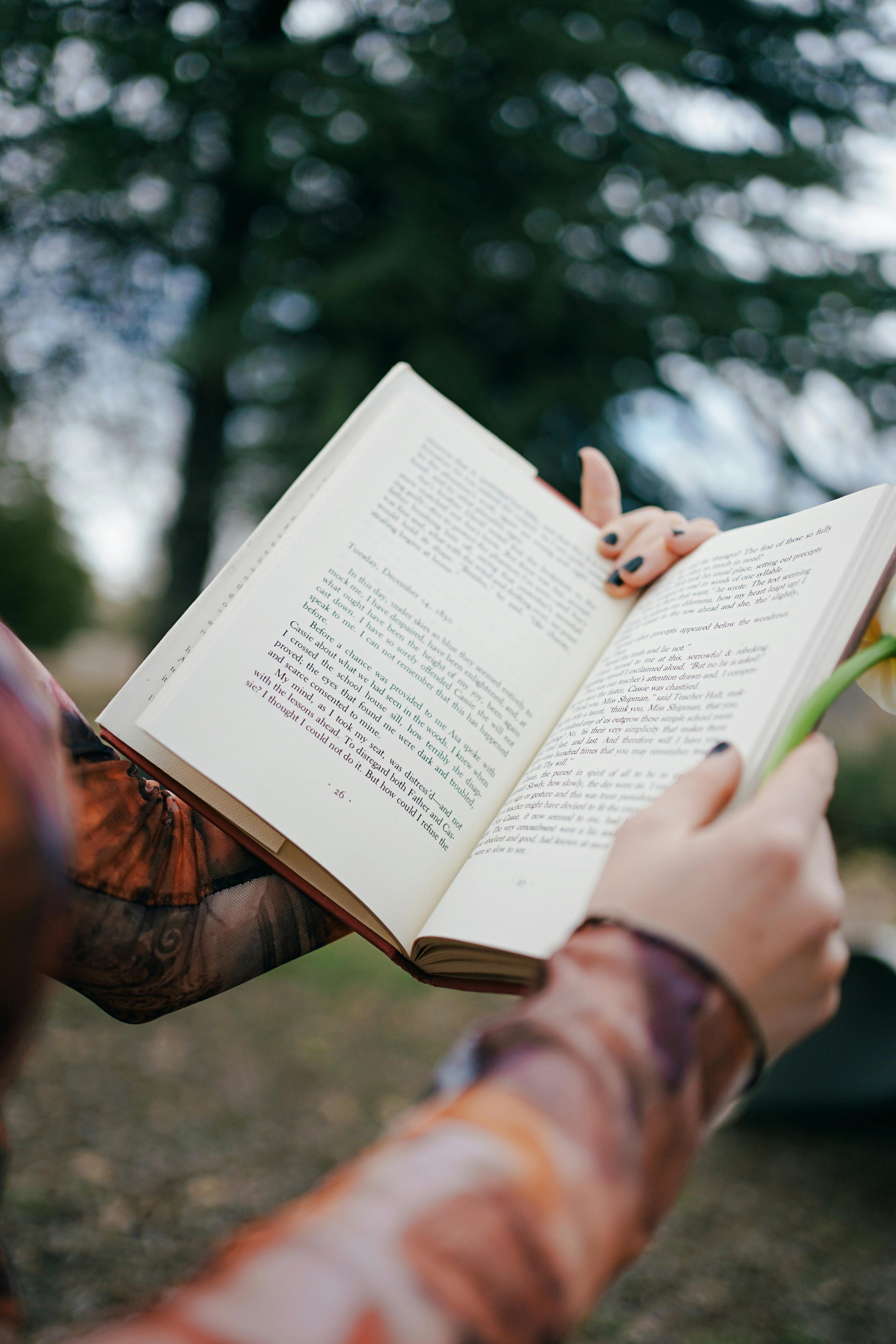 Open Book in Woman Hands · Free Stock Photo