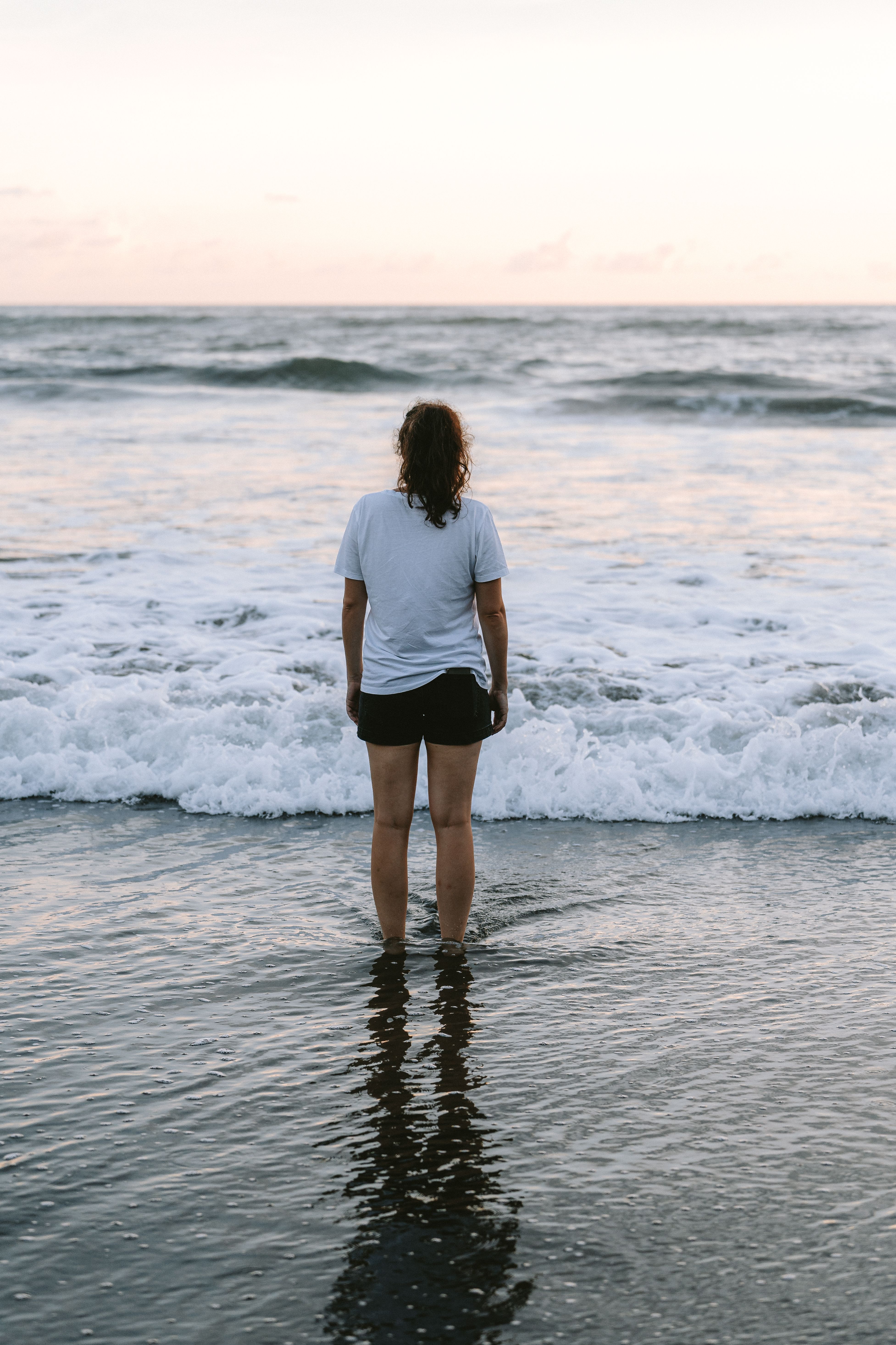 Woman Standing in Sea · Free Stock Photo