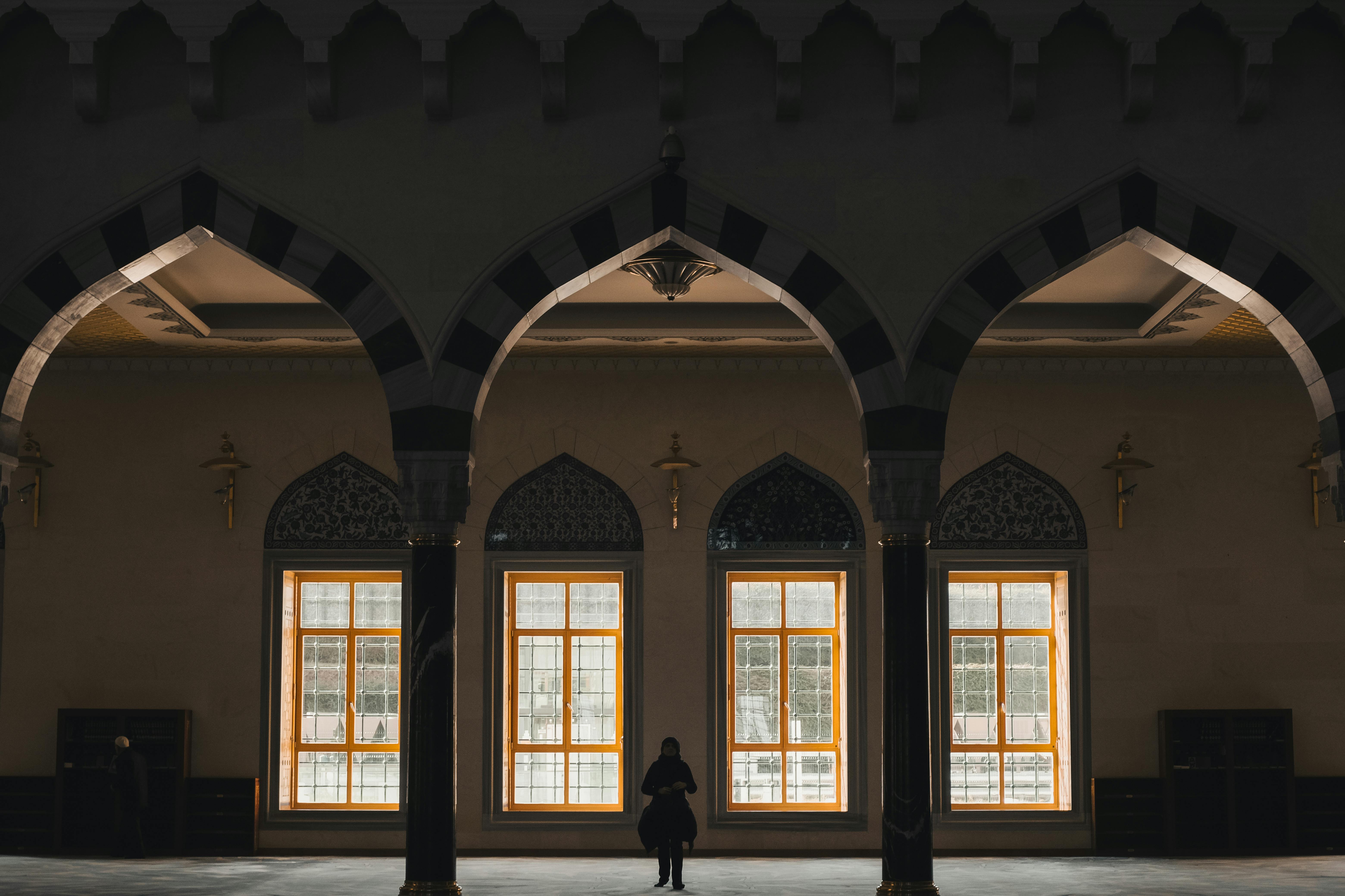 Open Quran on an Ornamented Wooden Book Stand in a Mosque · Free Stock ...