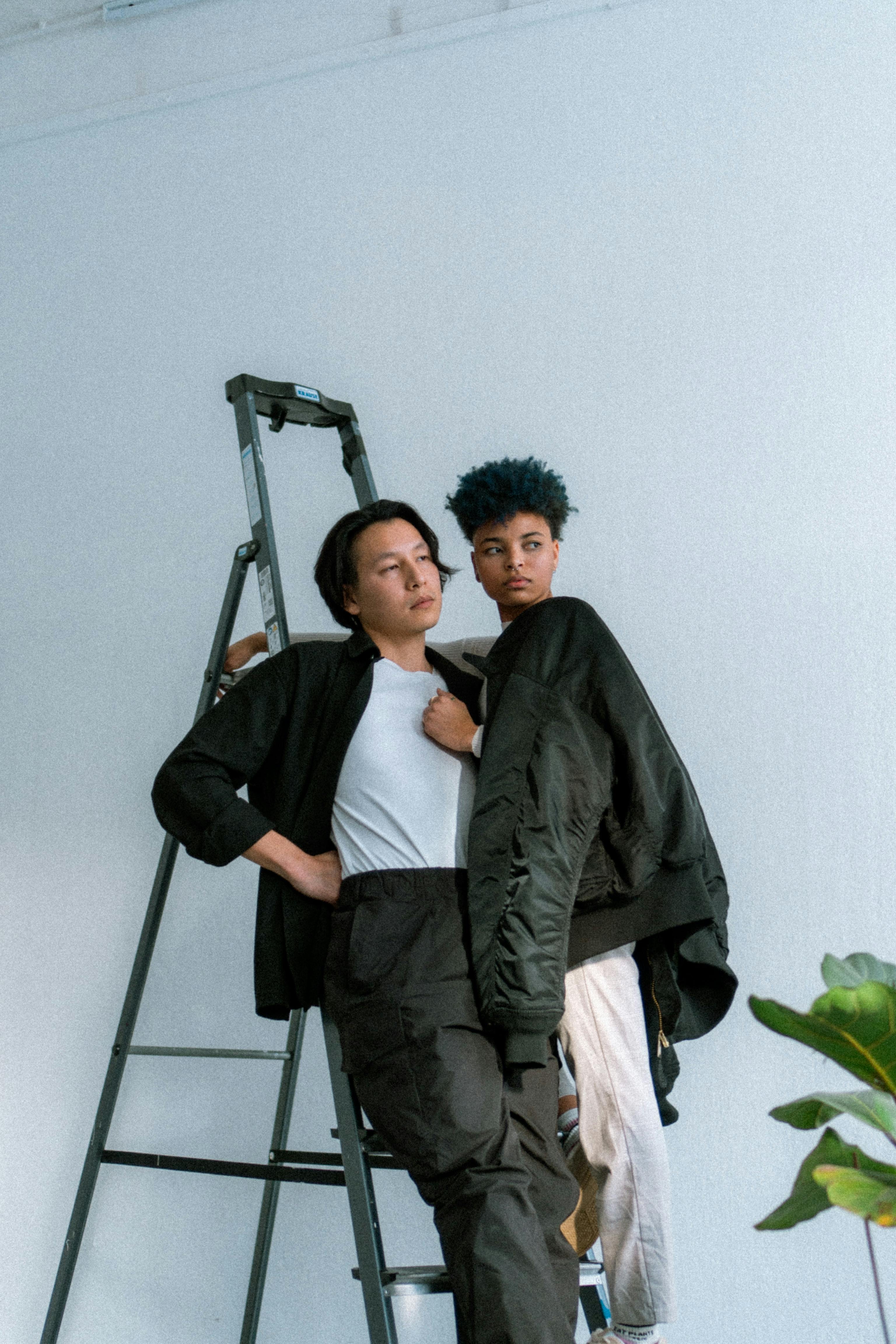 Couple Hugging on Ladder · Free Stock Photo