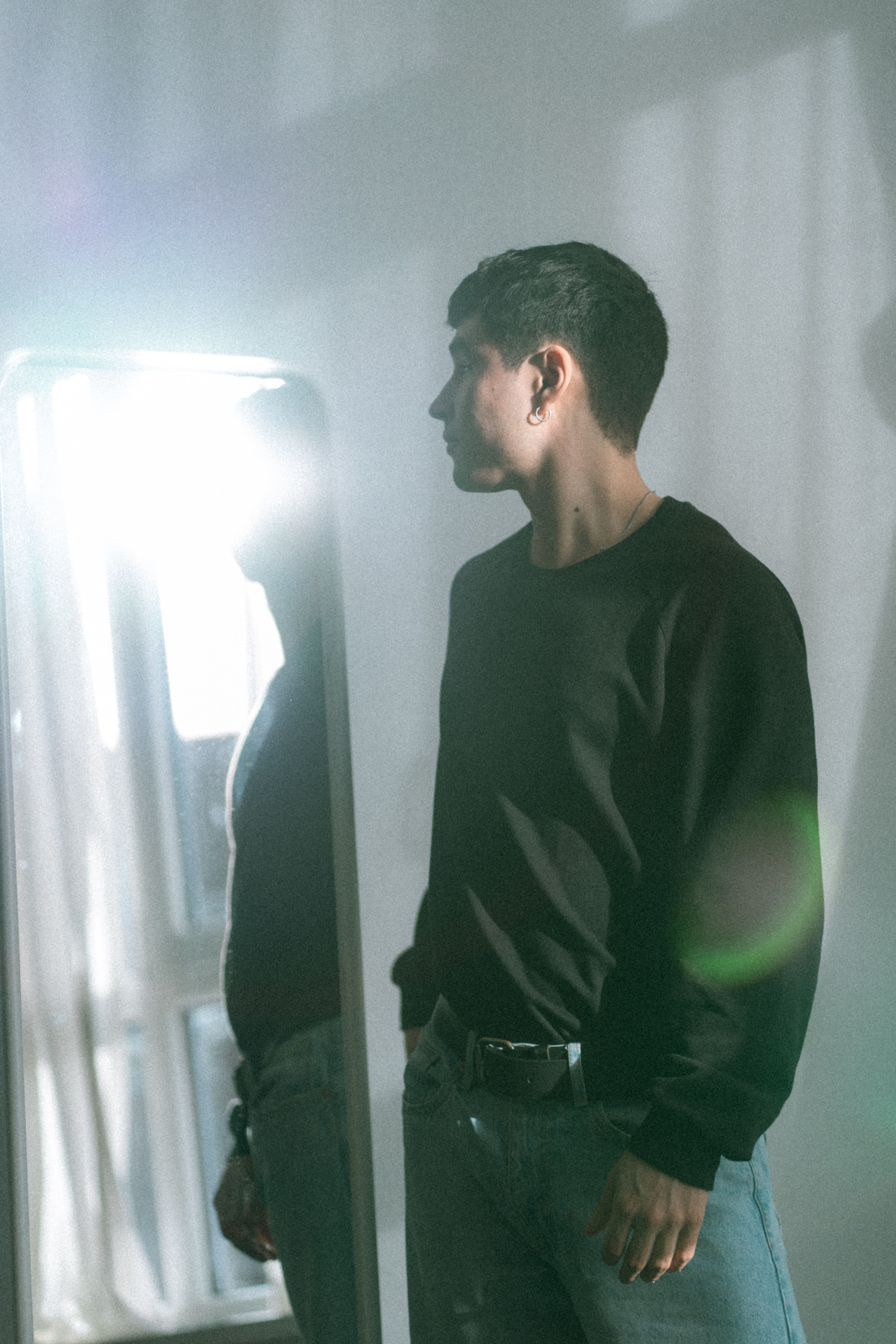 Sunlight Reflection in Mirror near Man · Free Stock Photo