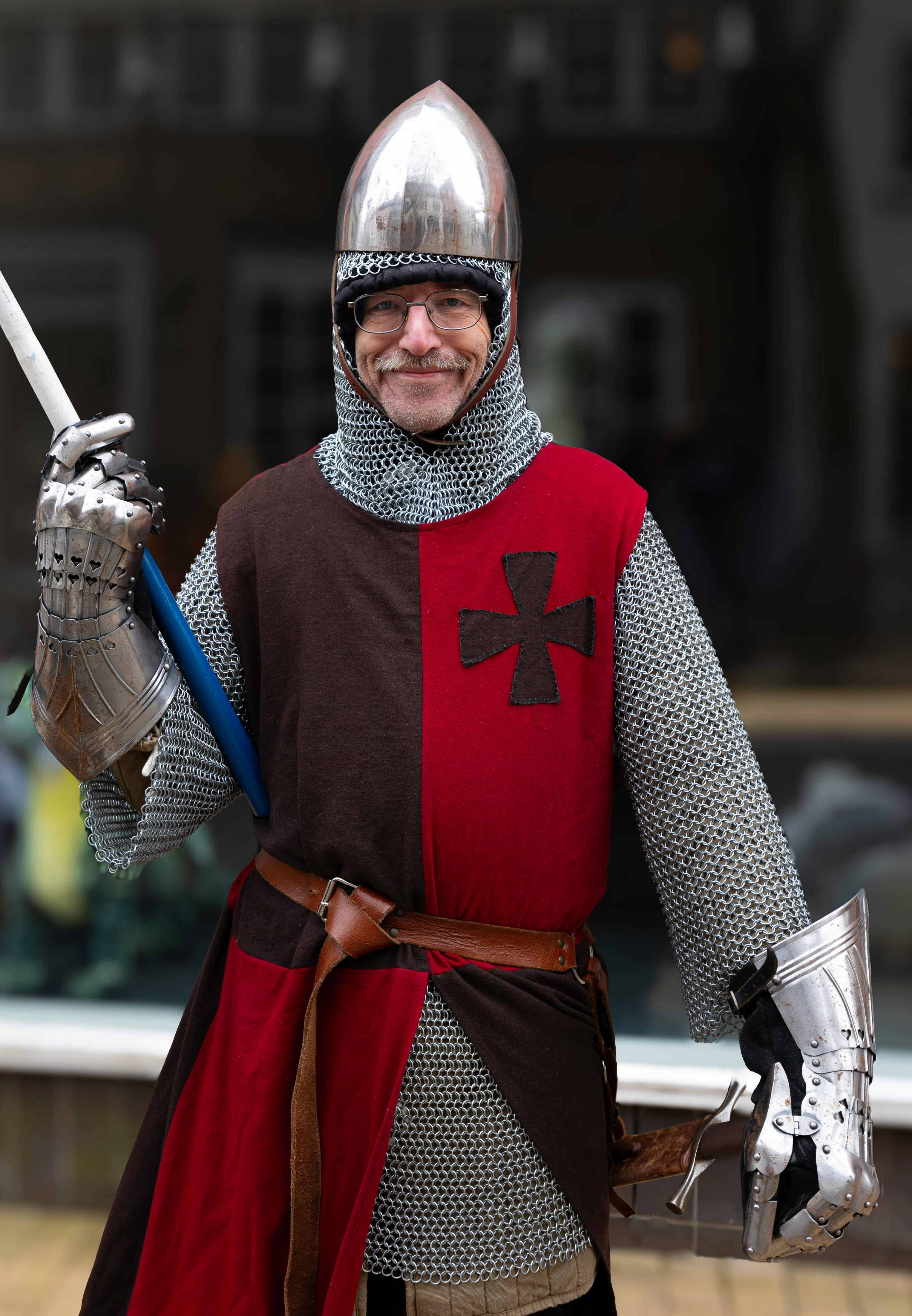 A Man with Mustache Wearing a Medieval Knight Armor · Free Stock Photo