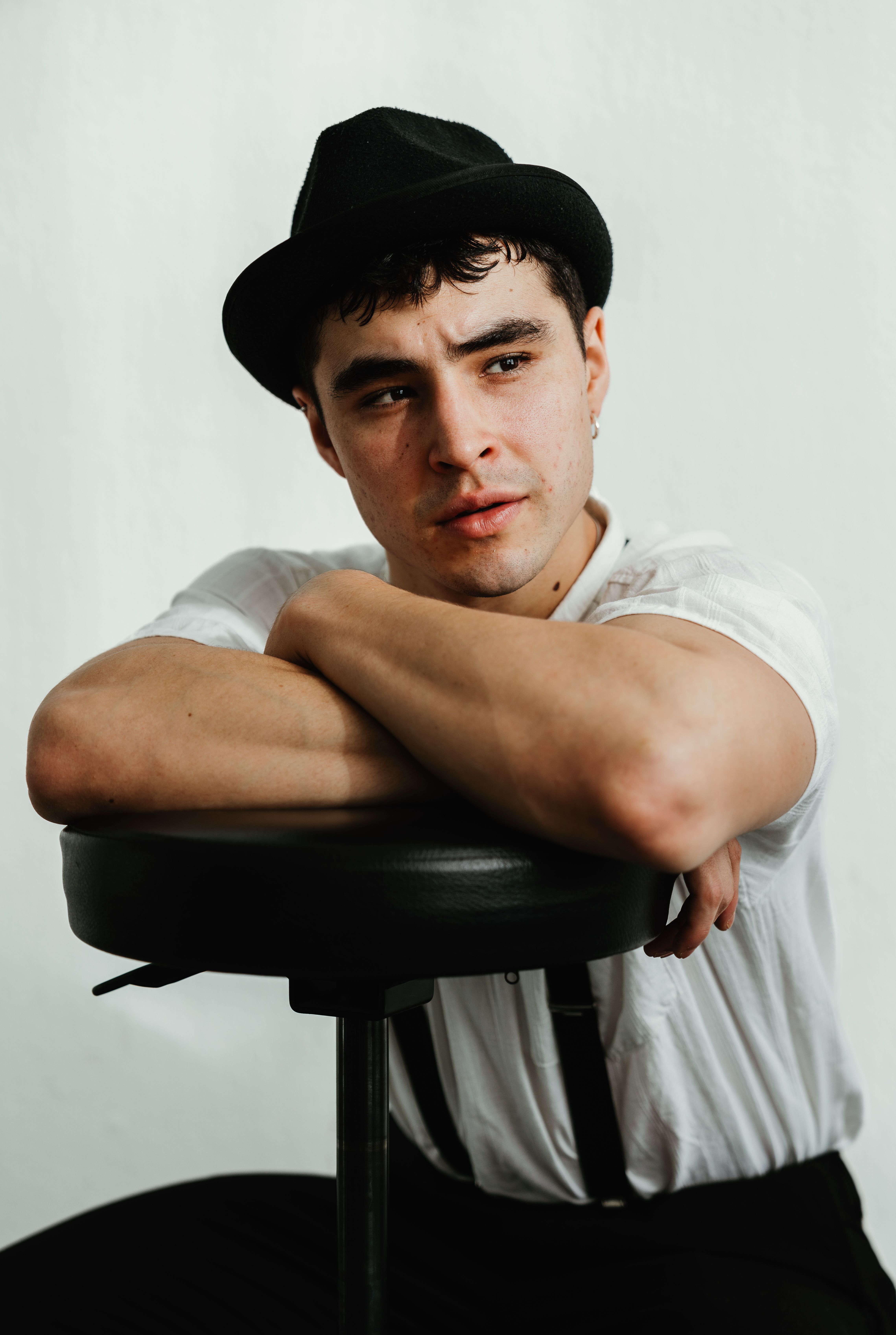 Man Sitting in Hat · Free Stock Photo
