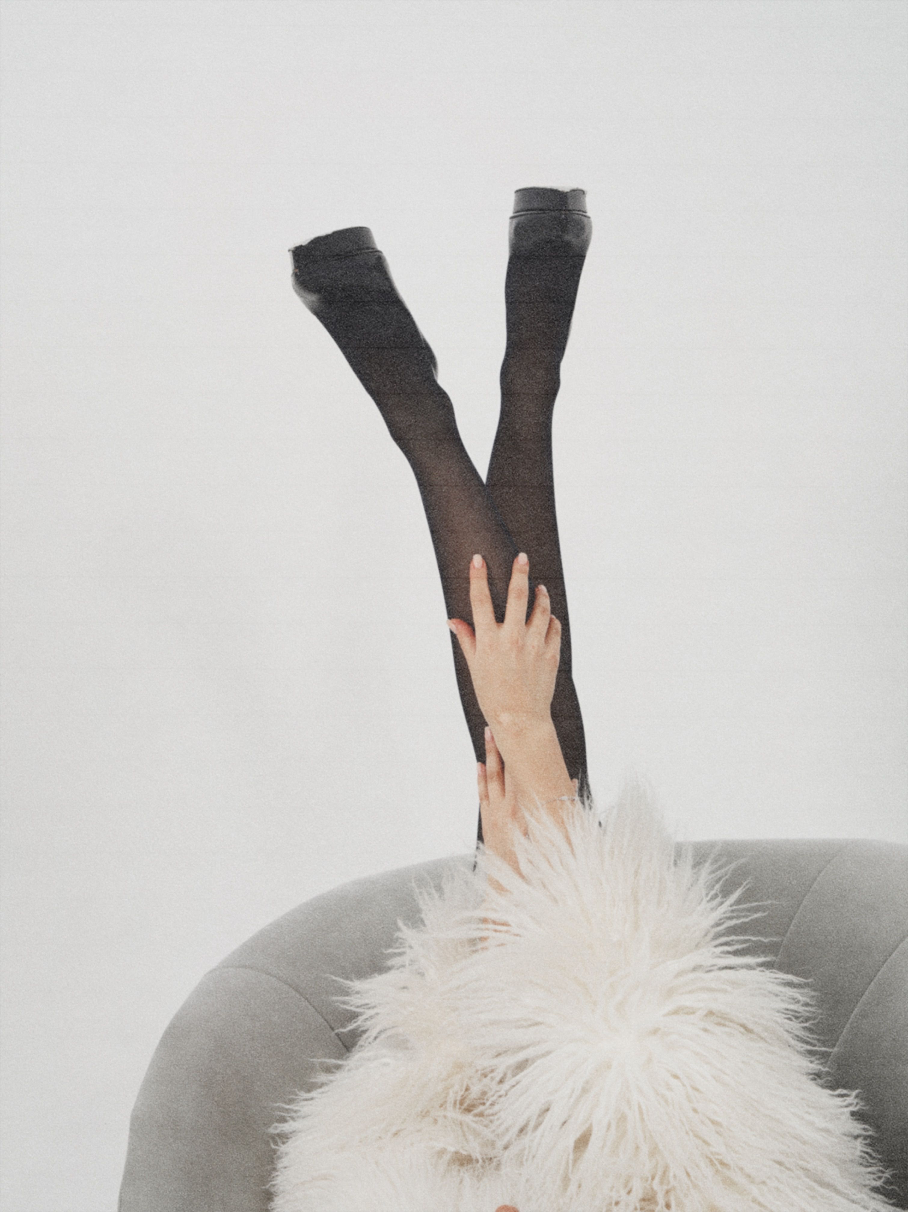 Legs of Woman Wearing a Fur Coat, Black Tights and Heels · Free Stock Photo
