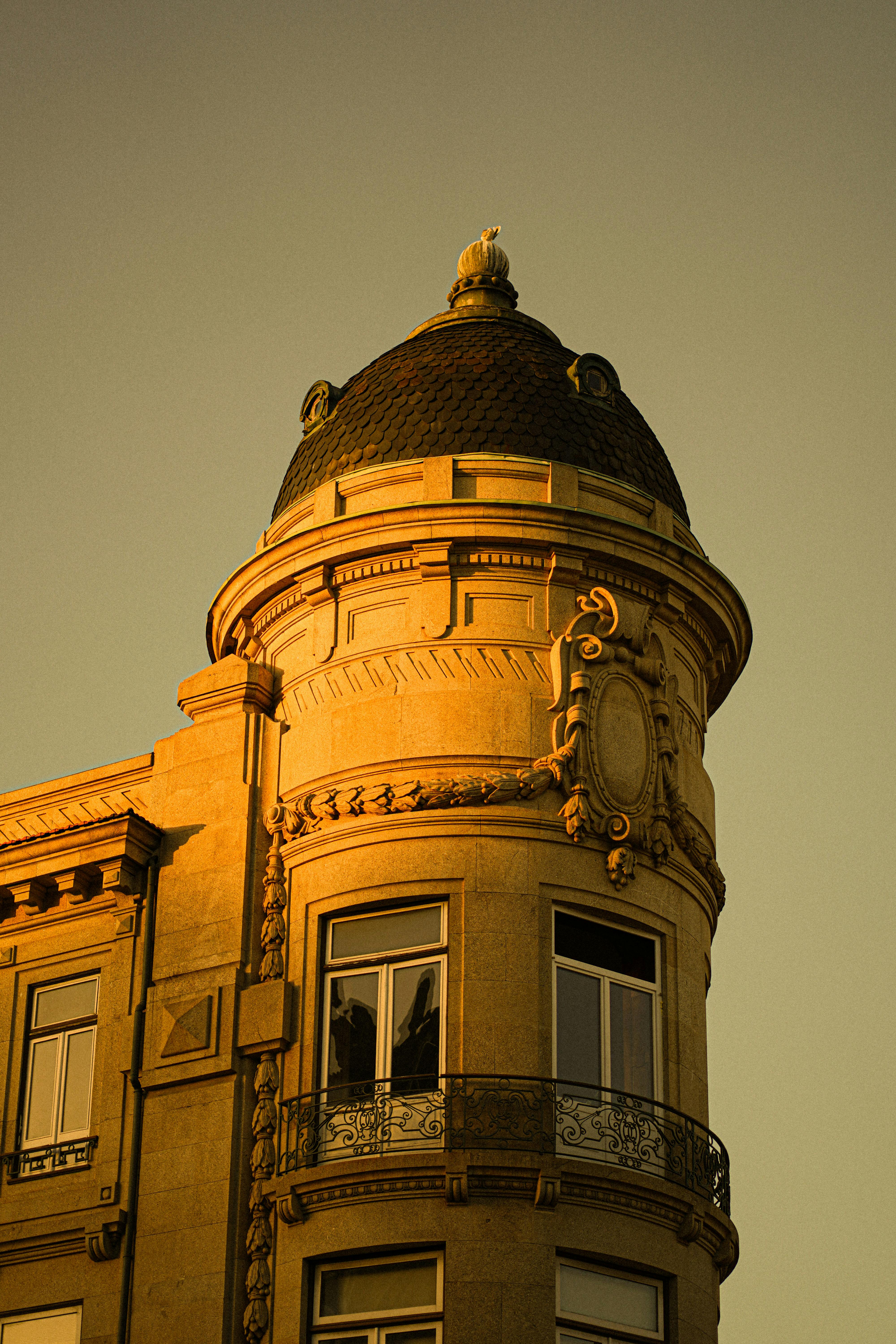 Tower in Building Corner at Sunset · Free Stock Photo