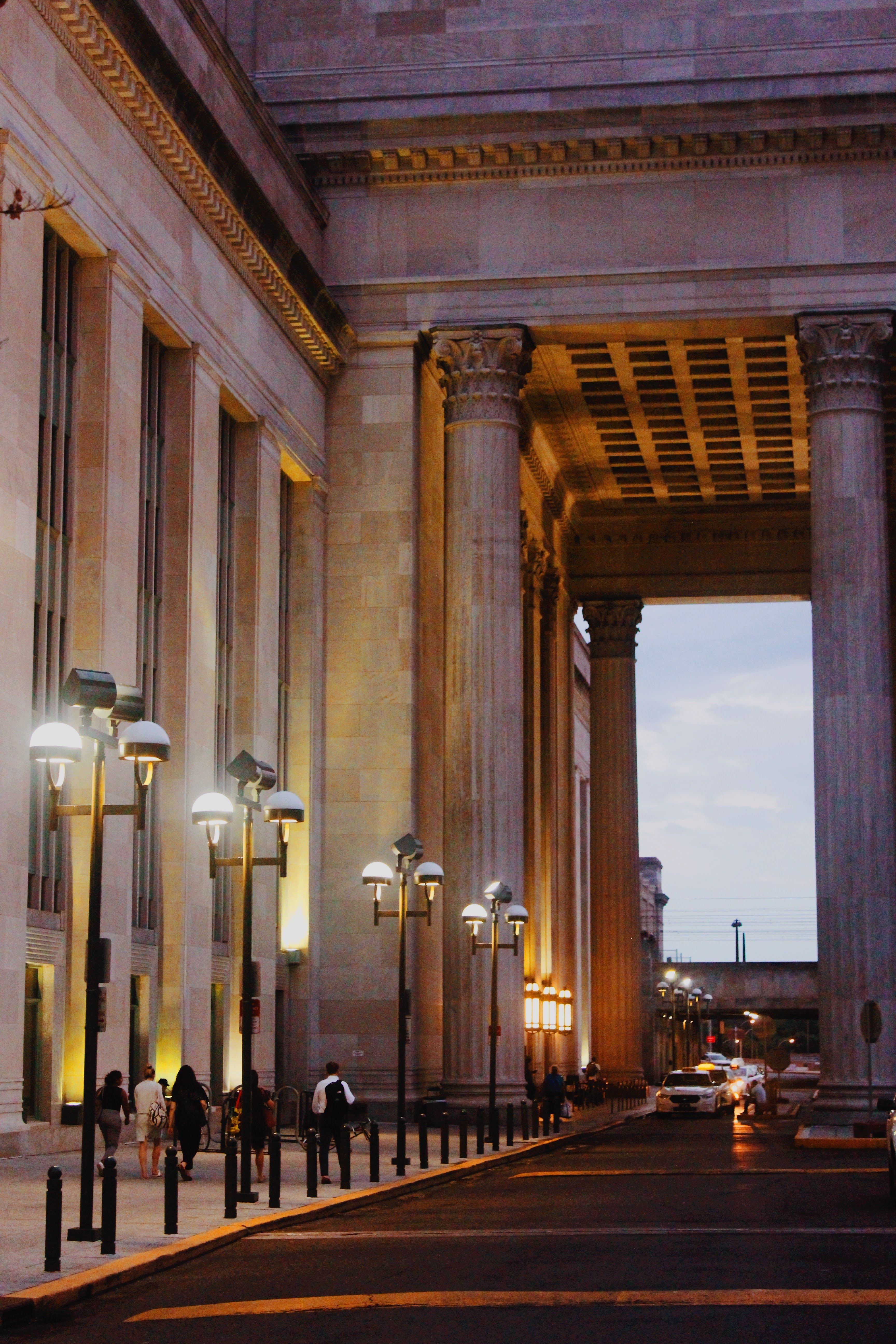 People Walking by Monumental Building · Free Stock Photo