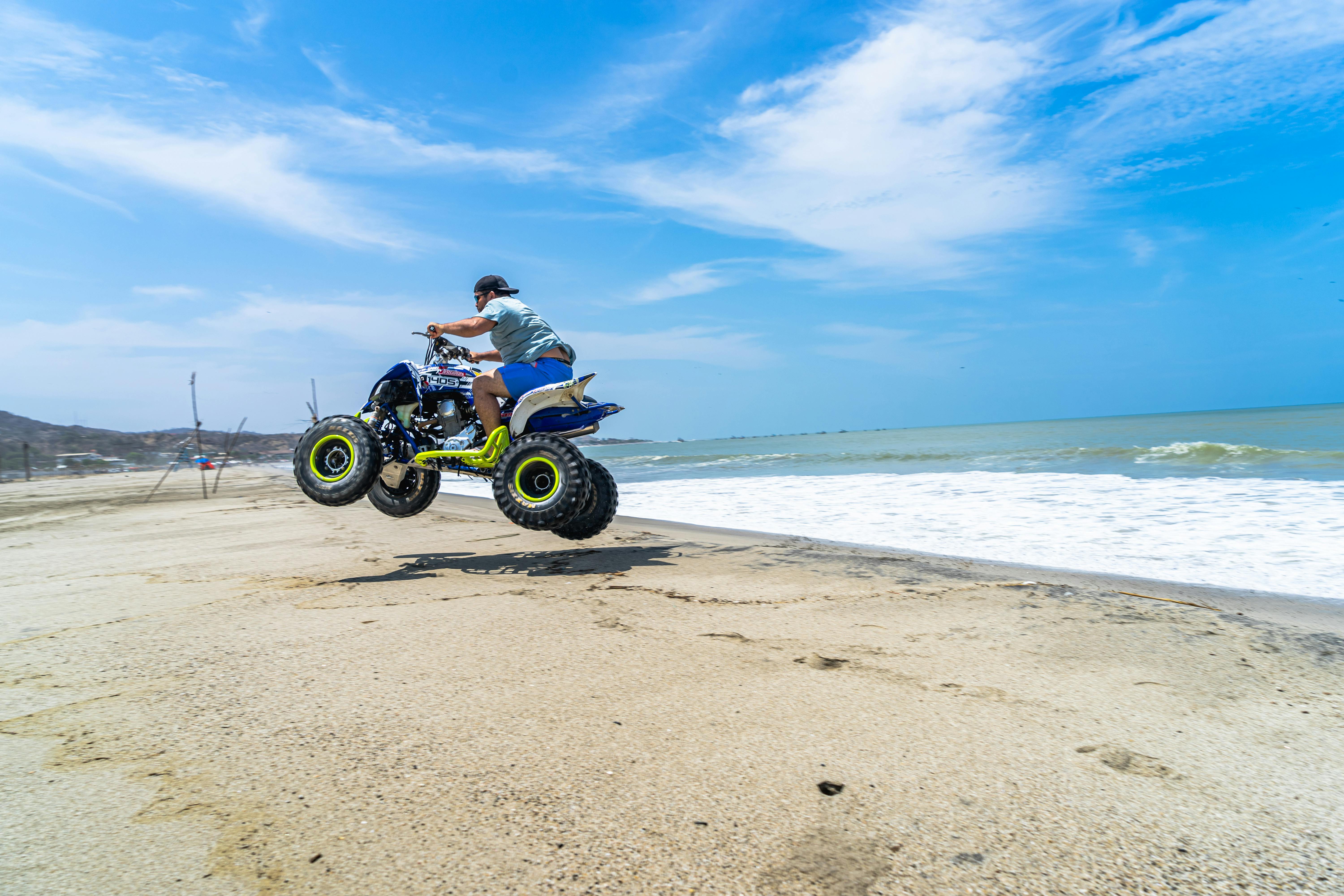 Man Riding on a Quad Bike · Free Stock Photo