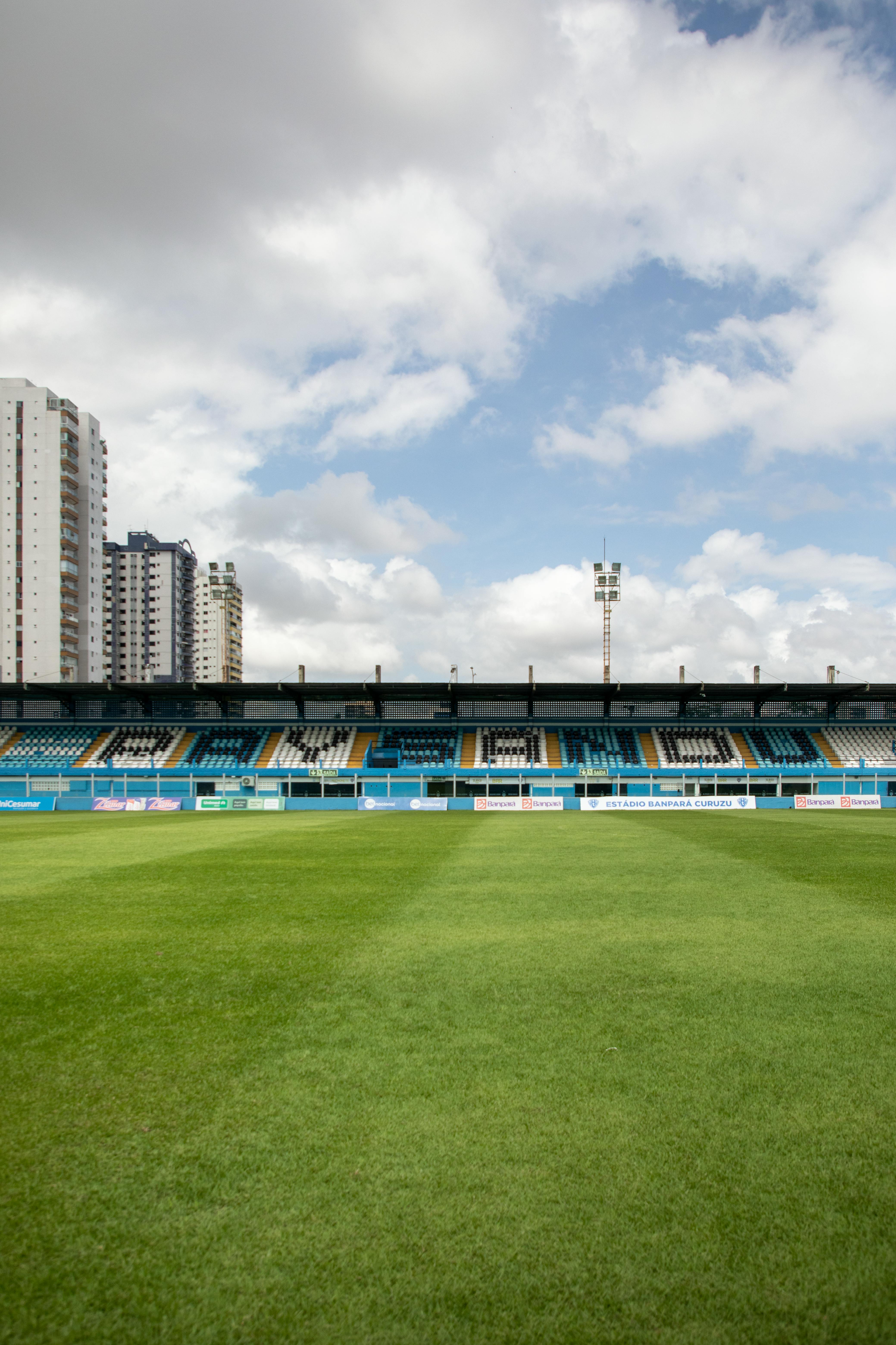 Two Football Stadium Lights · Free Stock Photo