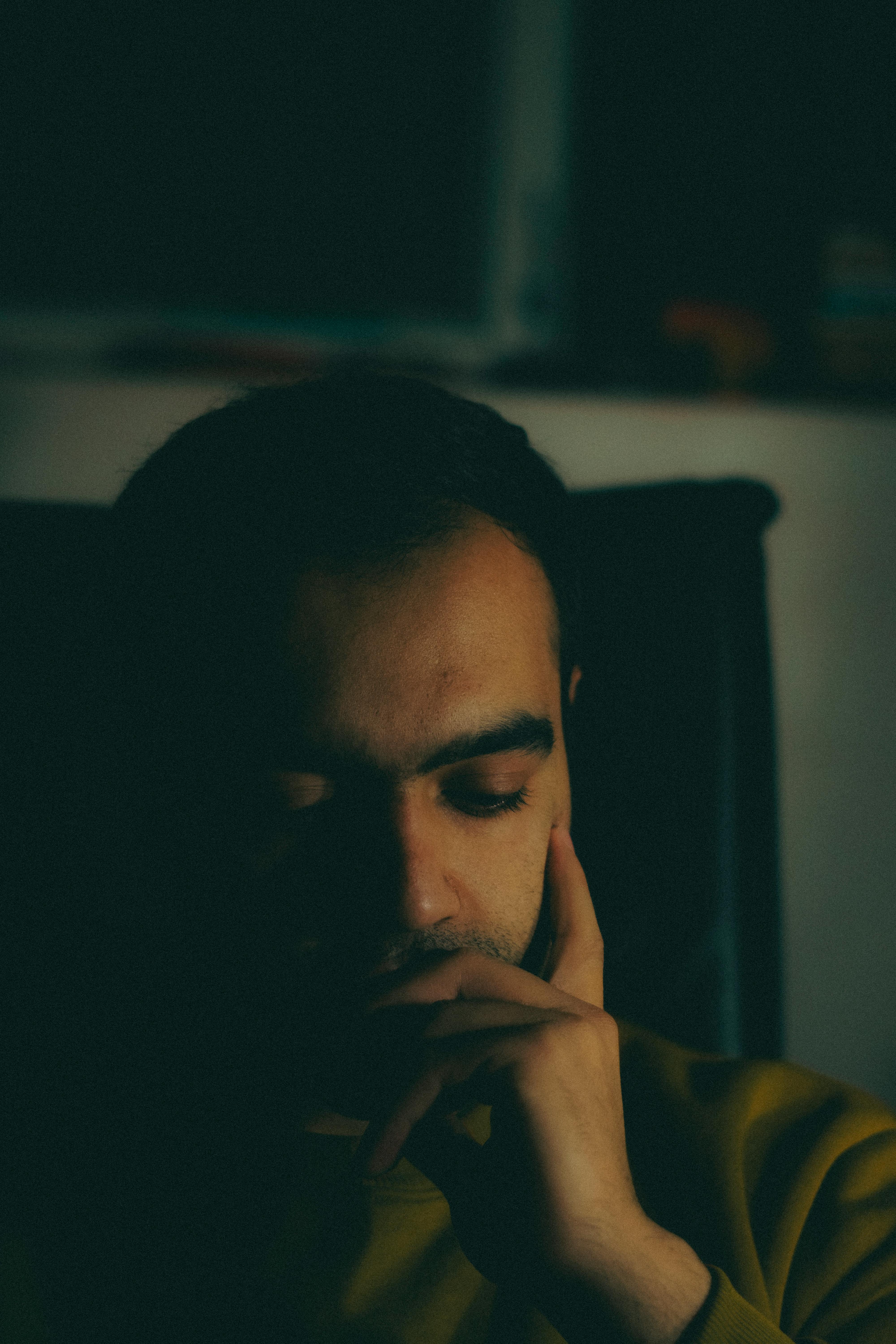 Face of Thinking Man in Darkness · Free Stock Photo