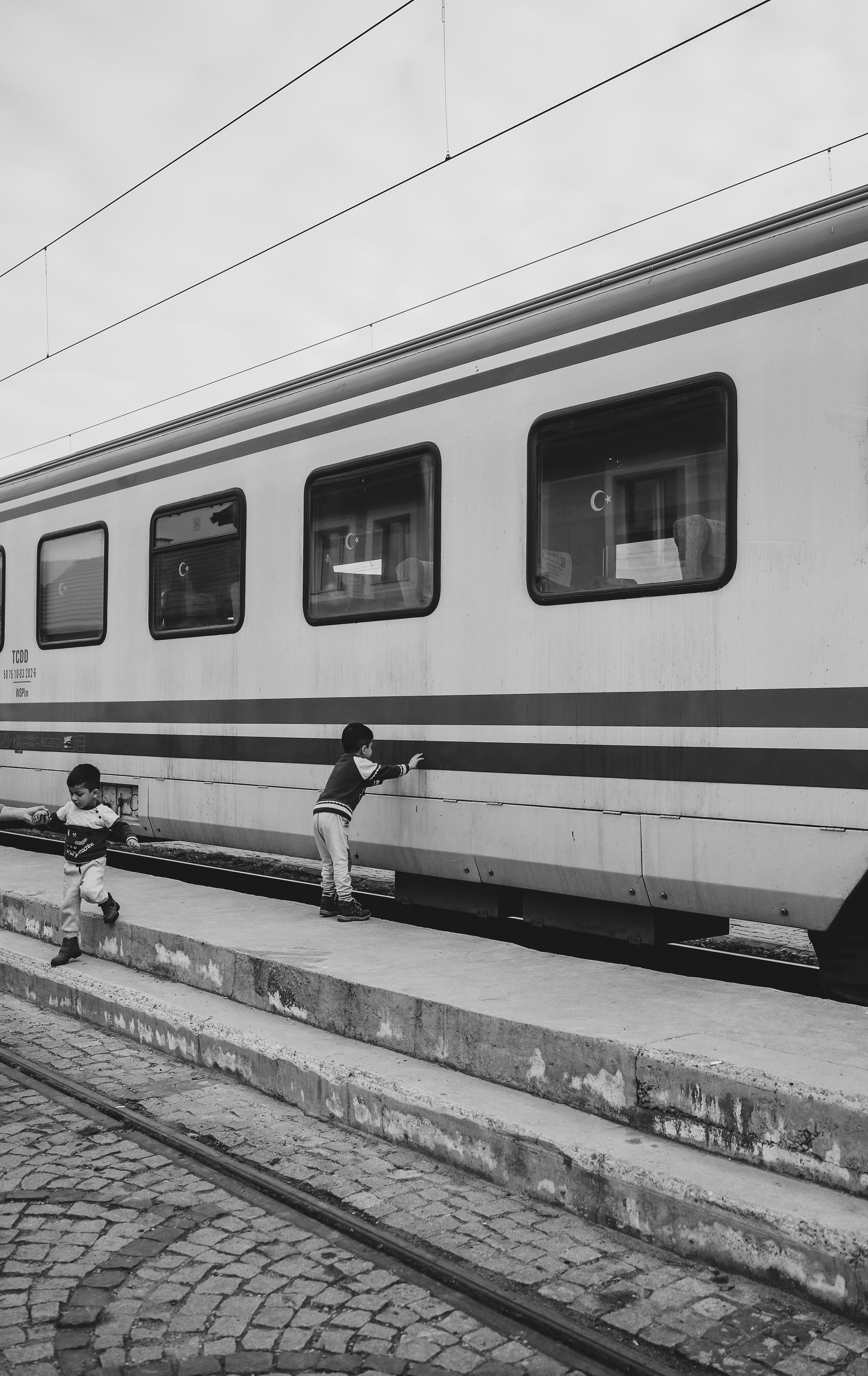 Boys Playing near Train · Free Stock Photo