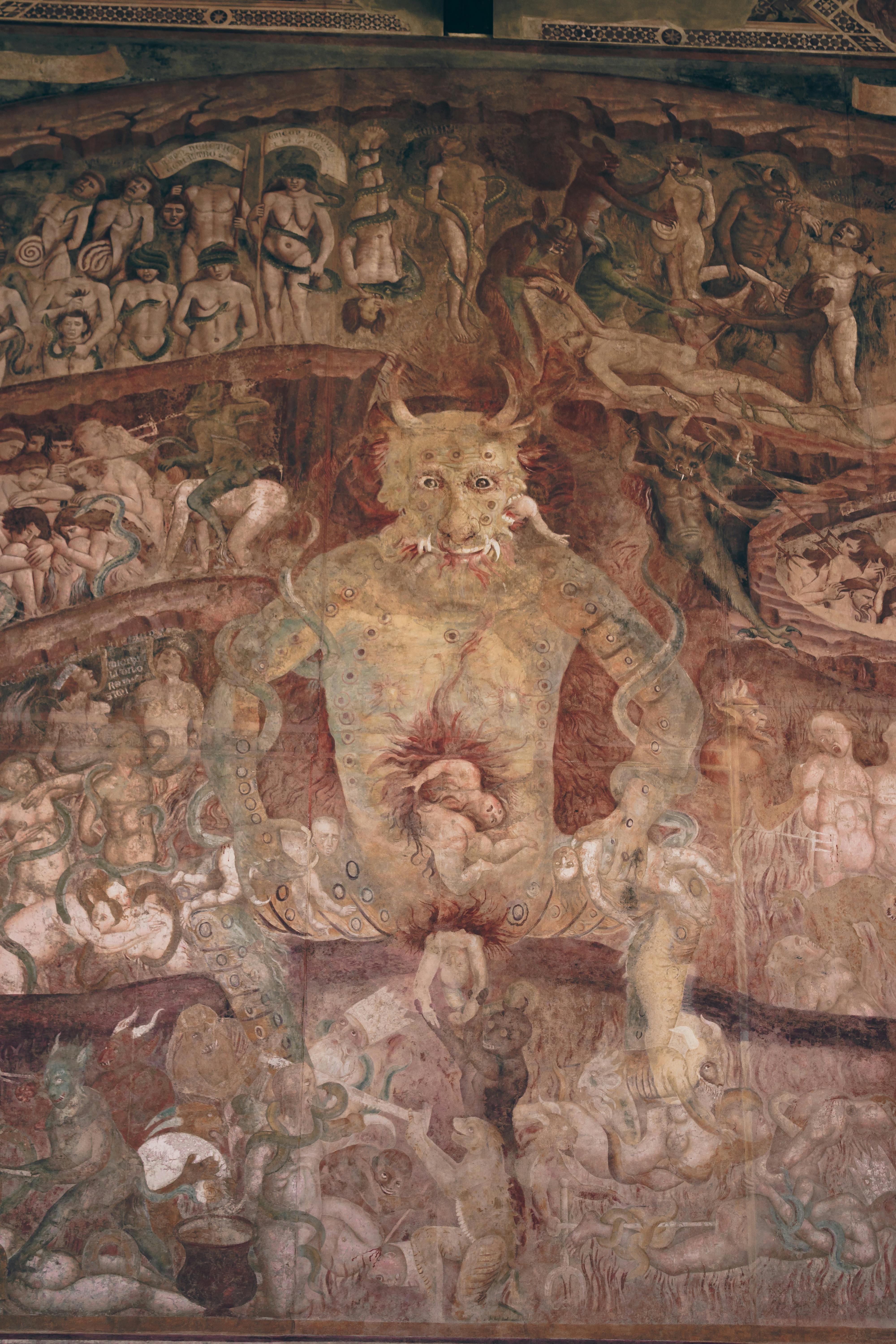 The mural depicts a demon and other creatures · Free Stock Photo