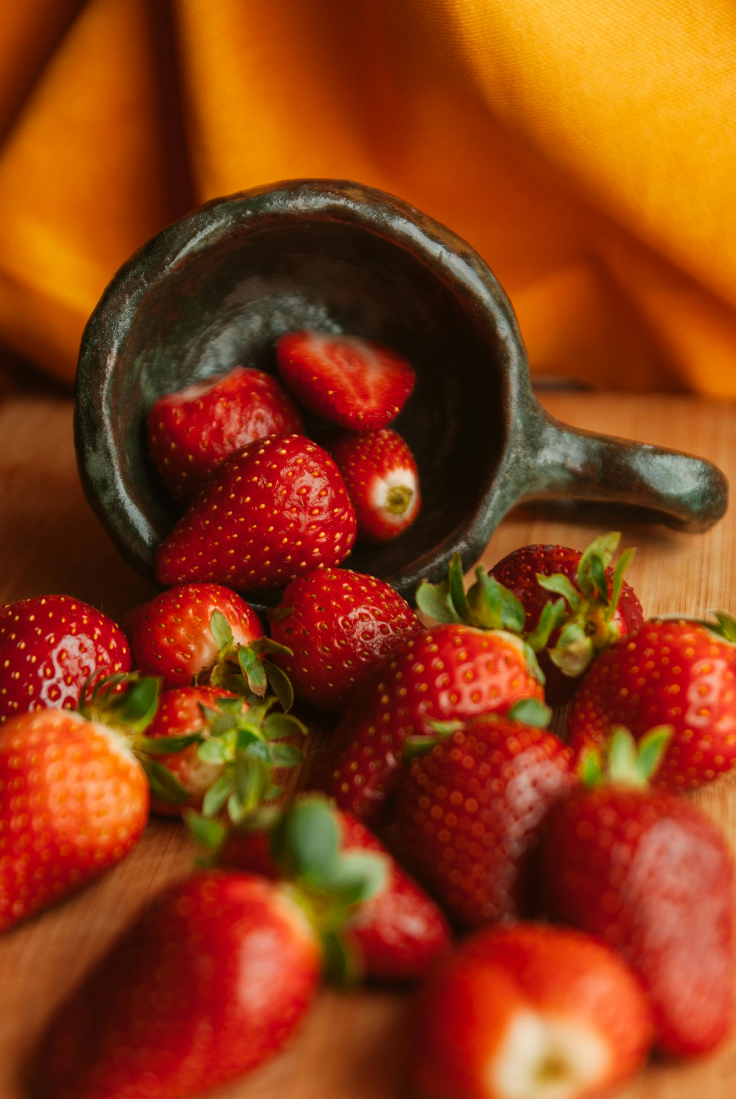 Red Strawberries around Coup Lying Down · Free Stock Photo