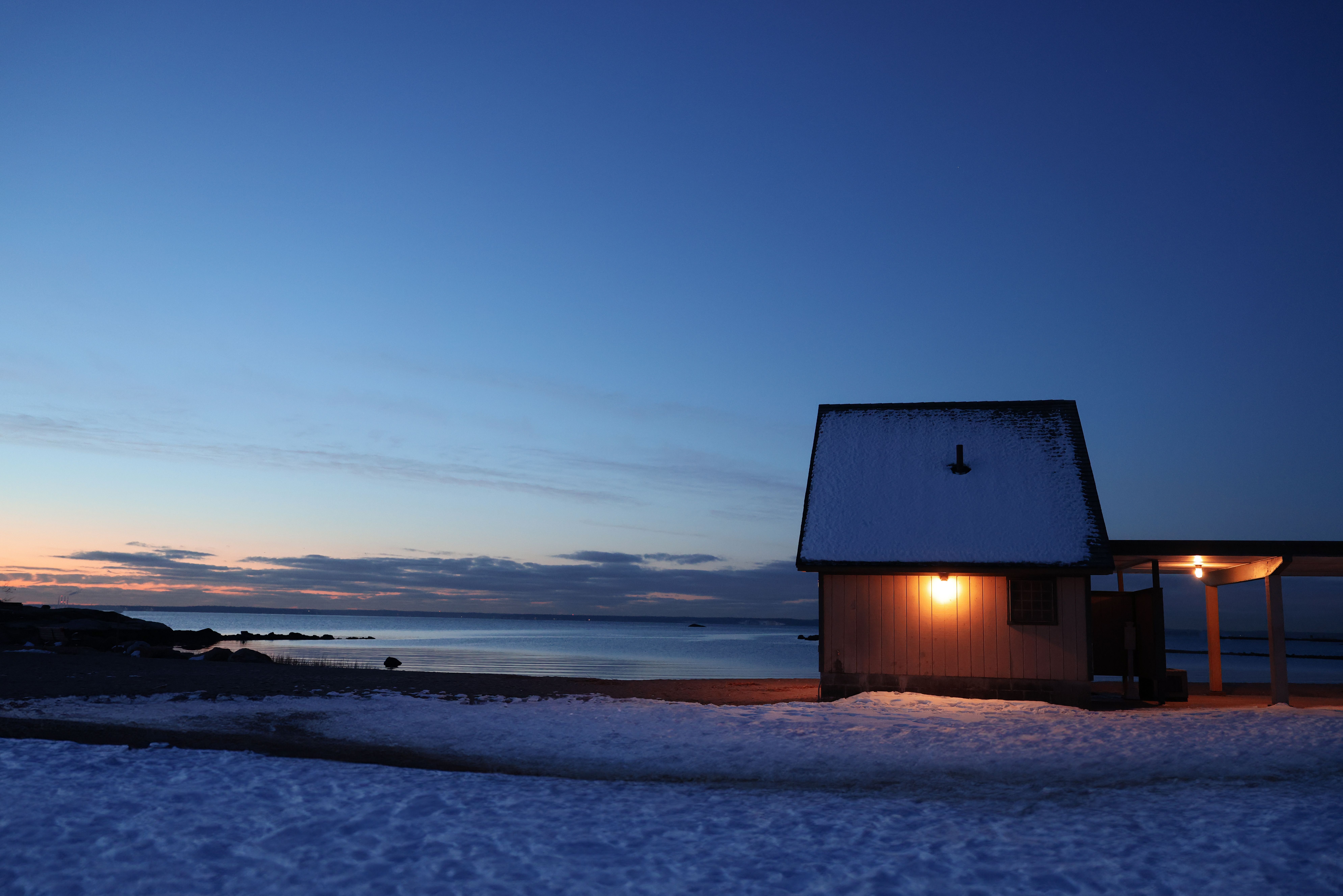 Wooden House on Sea Shore in Winter · Free Stock Photo