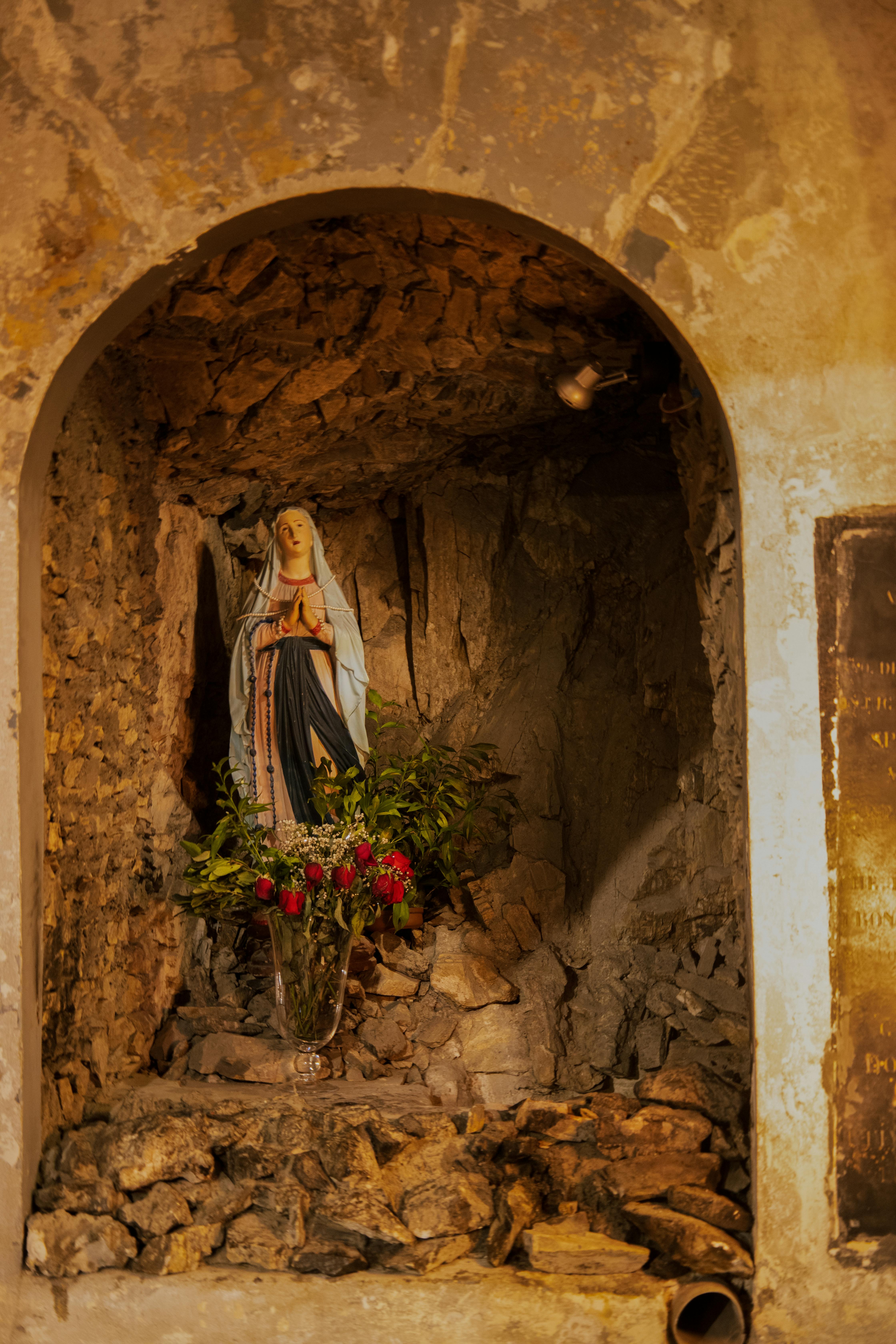 Virgin Mary Statue in Ruined Wall · Free Stock Photo