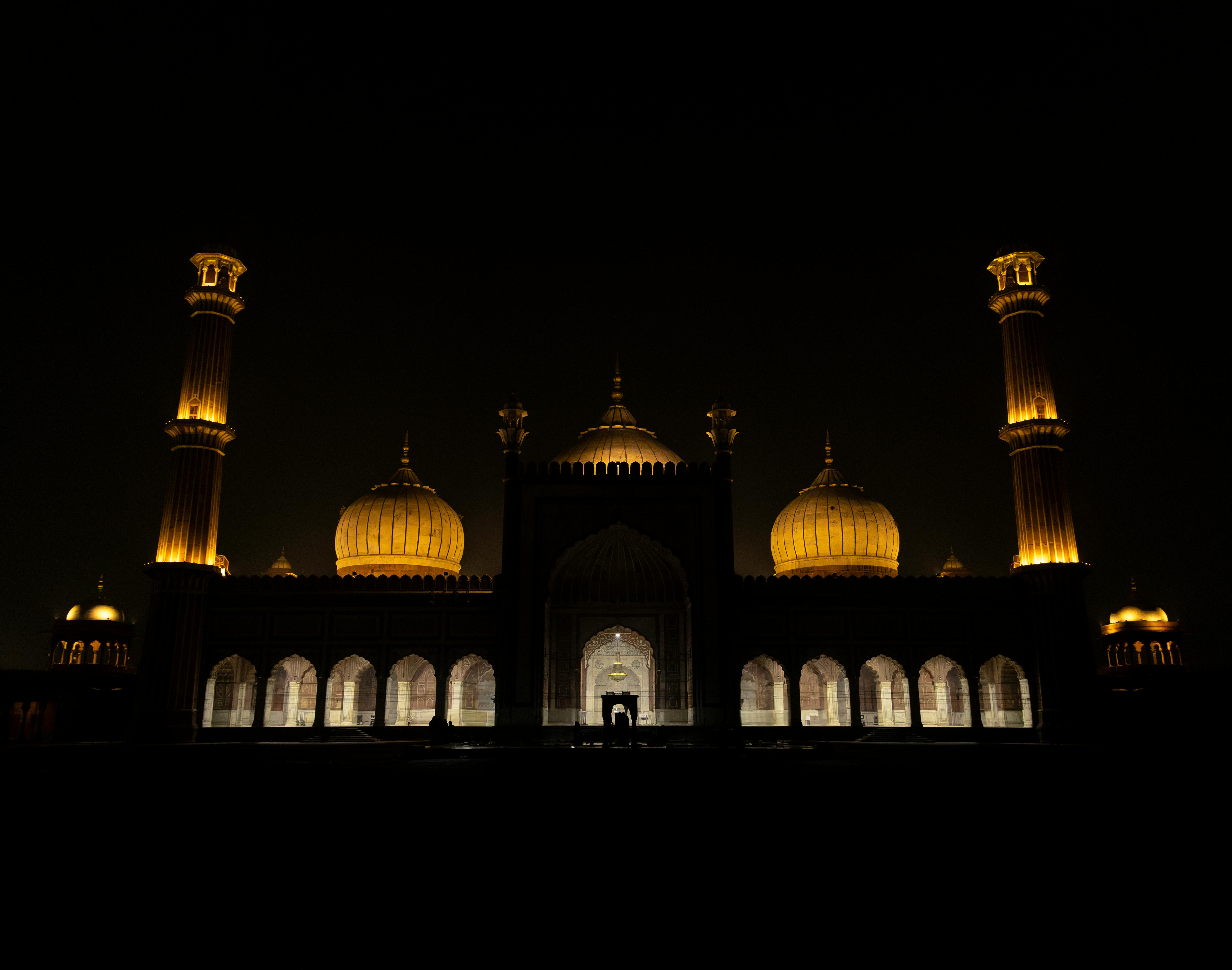 A mosque at night with lights on · Free Stock Photo