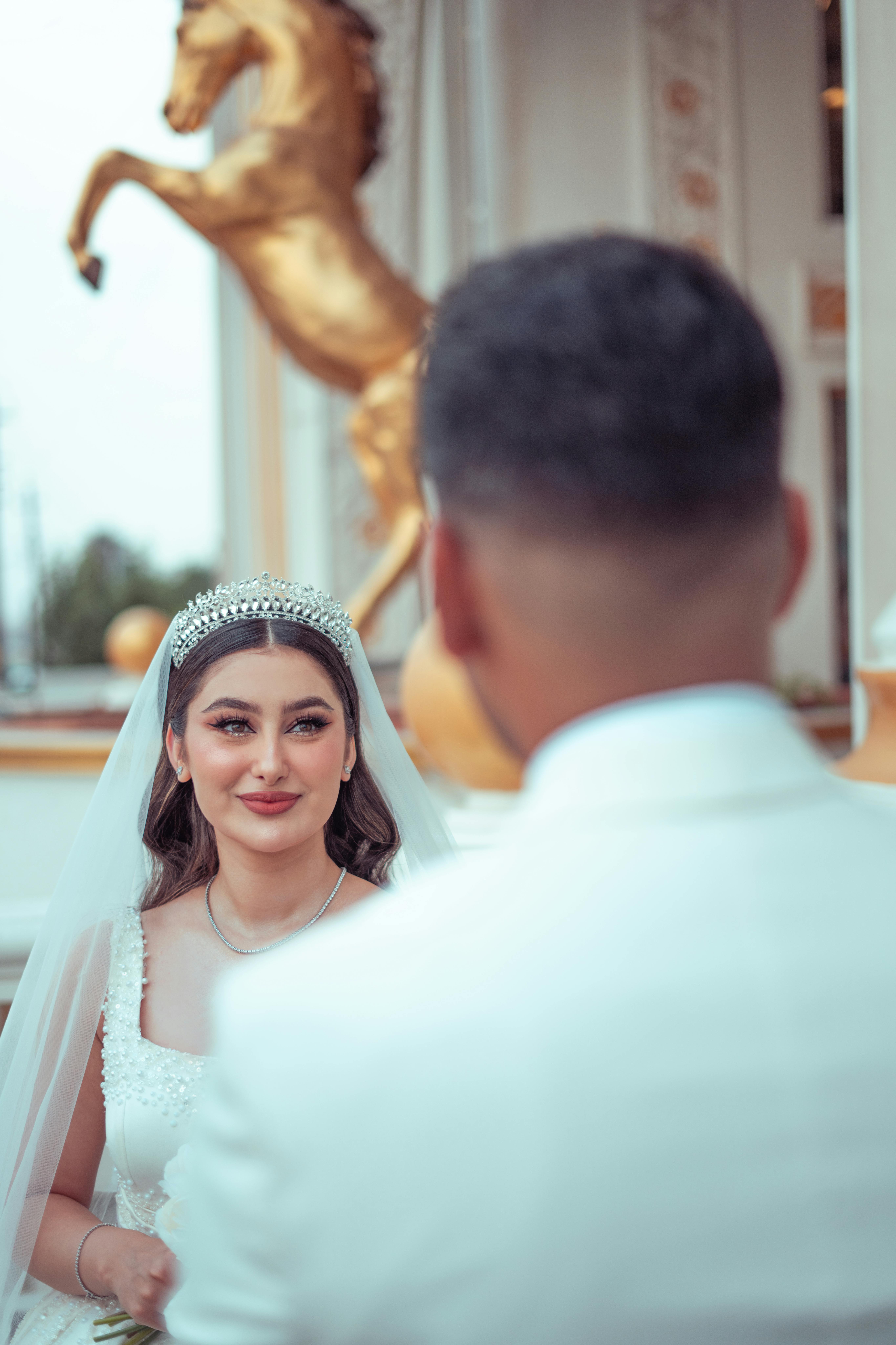 Wedding Couple in Front of a Church · Free Stock Photo