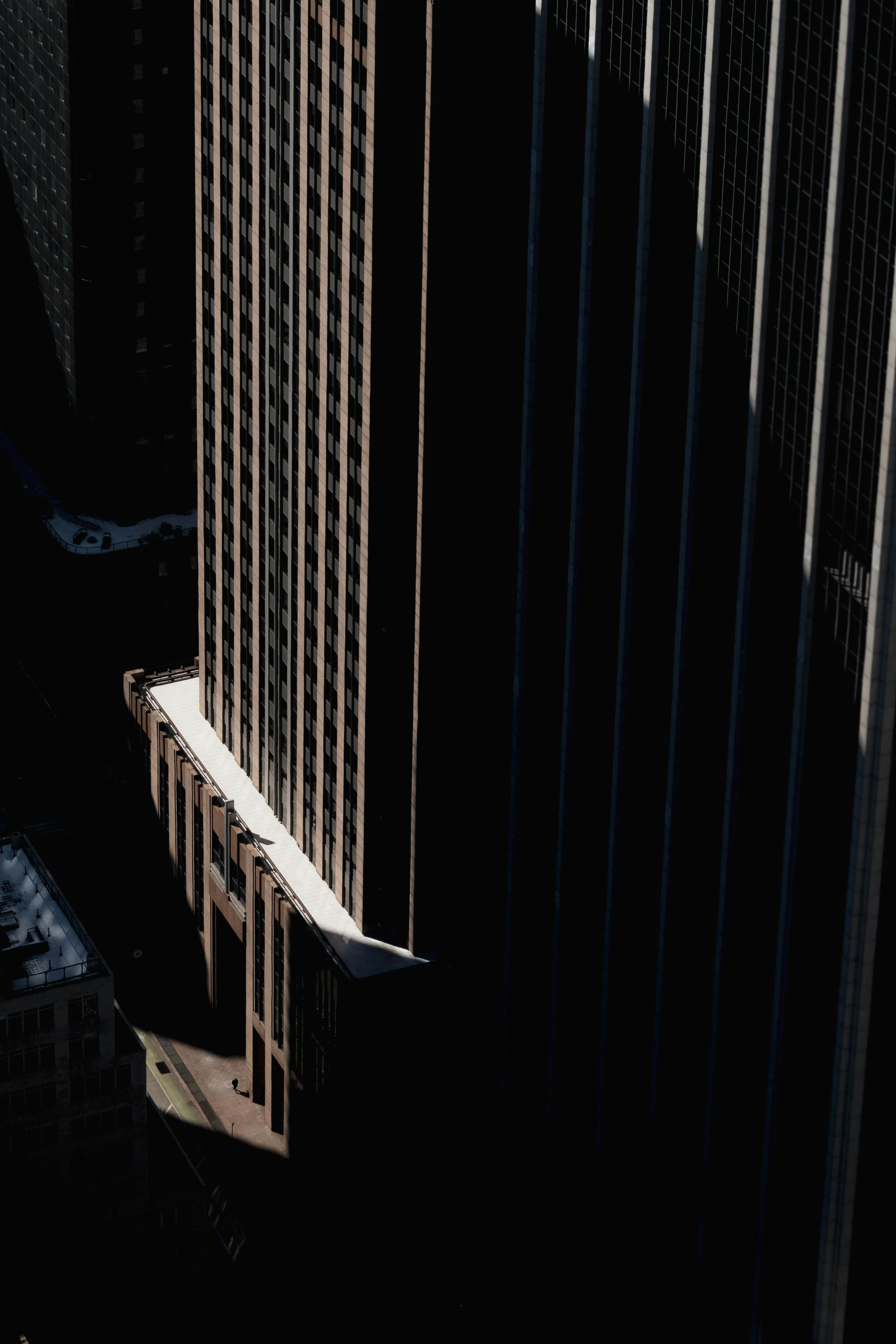 Skyscraper Wall in Shadow · Free Stock Photo