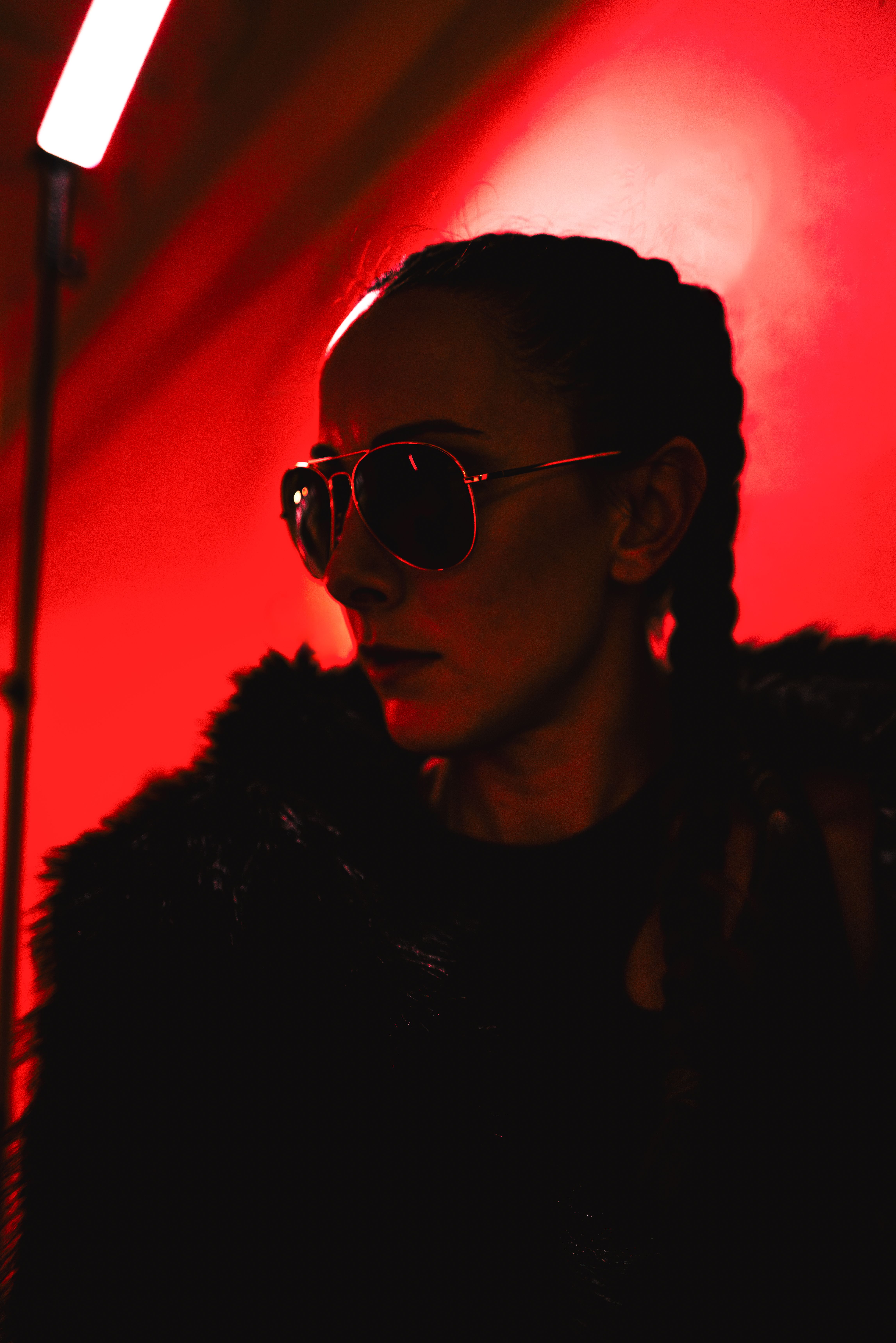Portrait of Woman in Red Light · Free Stock Photo