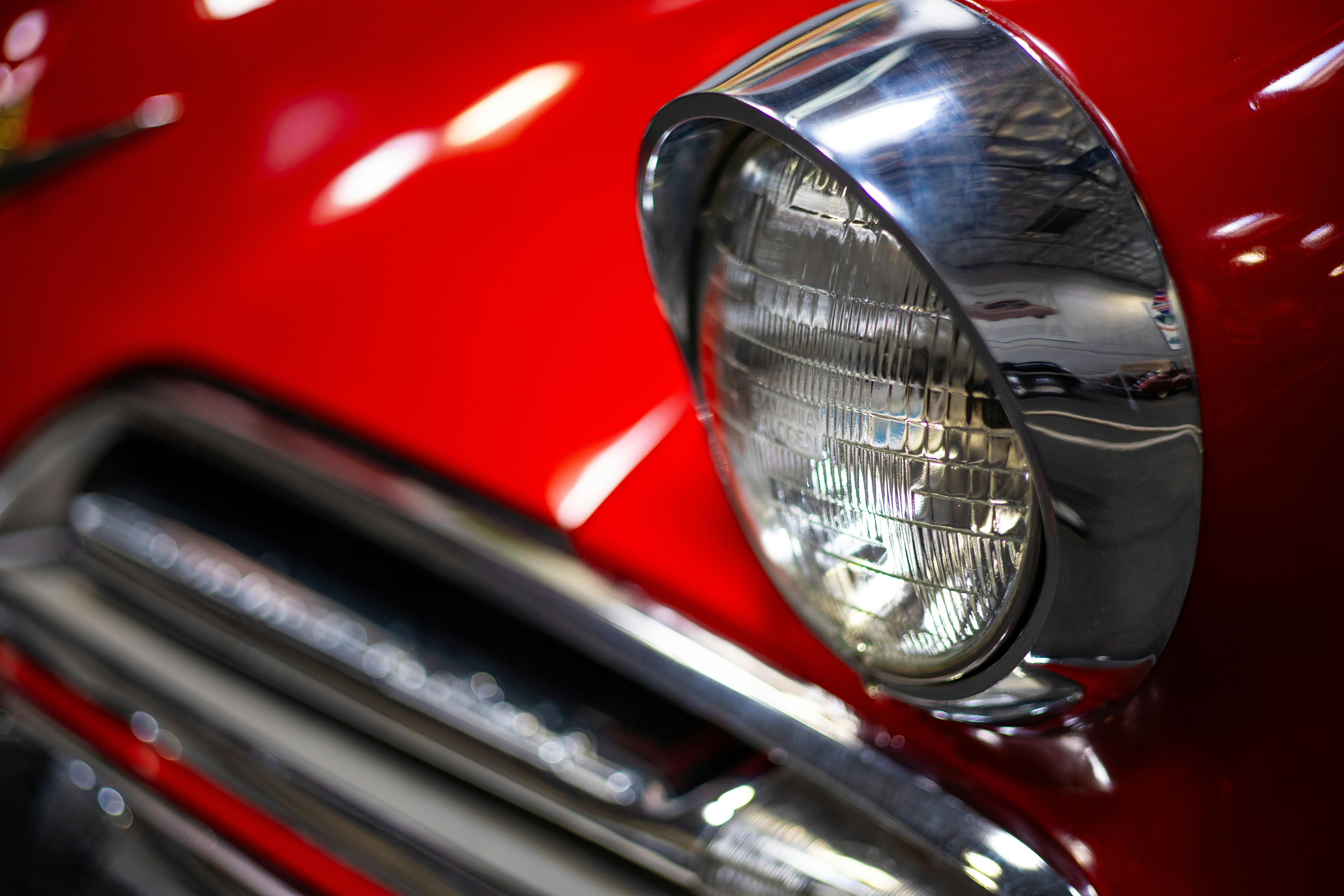 Headlight of a Classic Red Car · Free Stock Photo