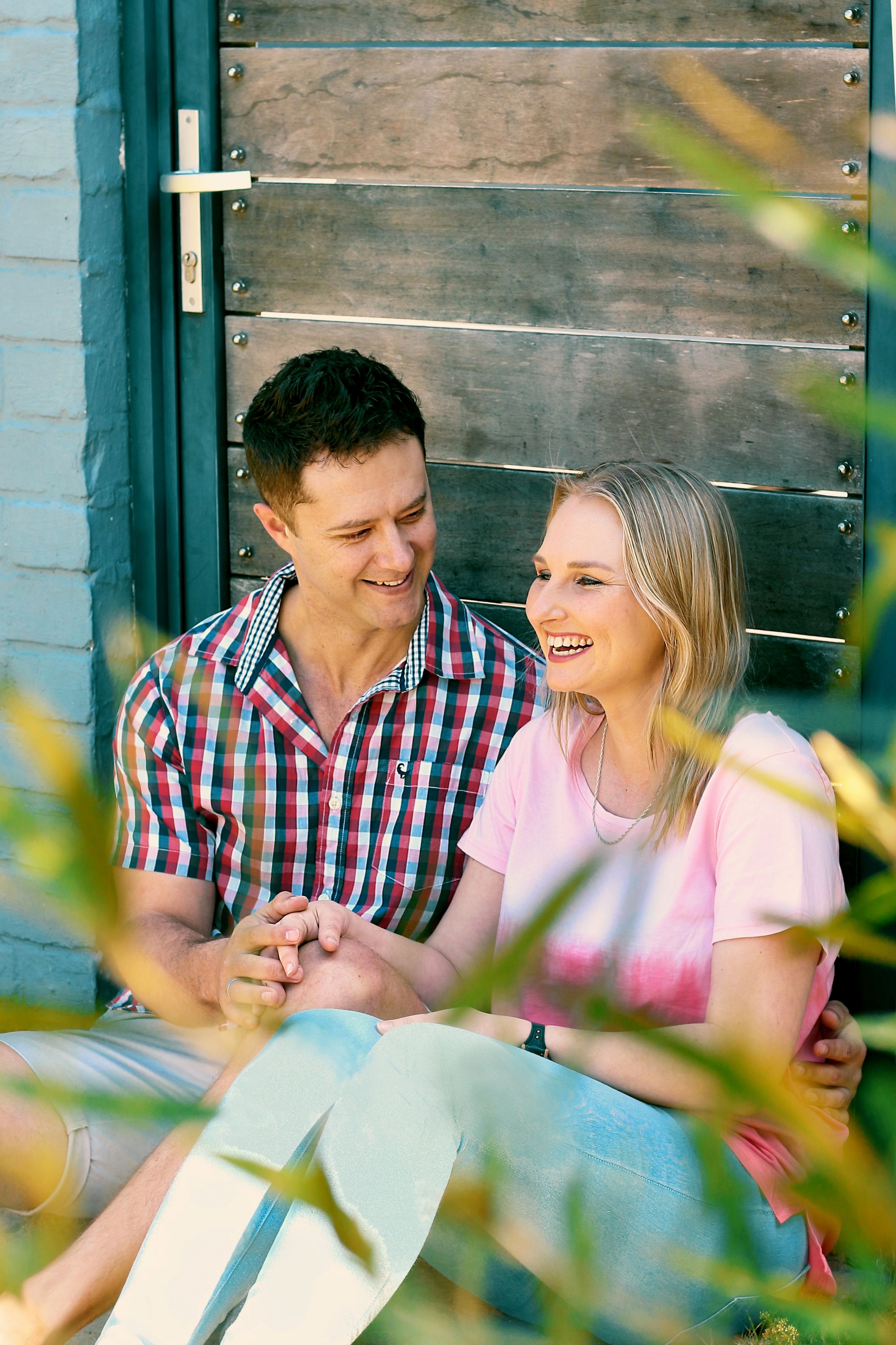 A Couple Sitting Outdoors · Free Stock Photo