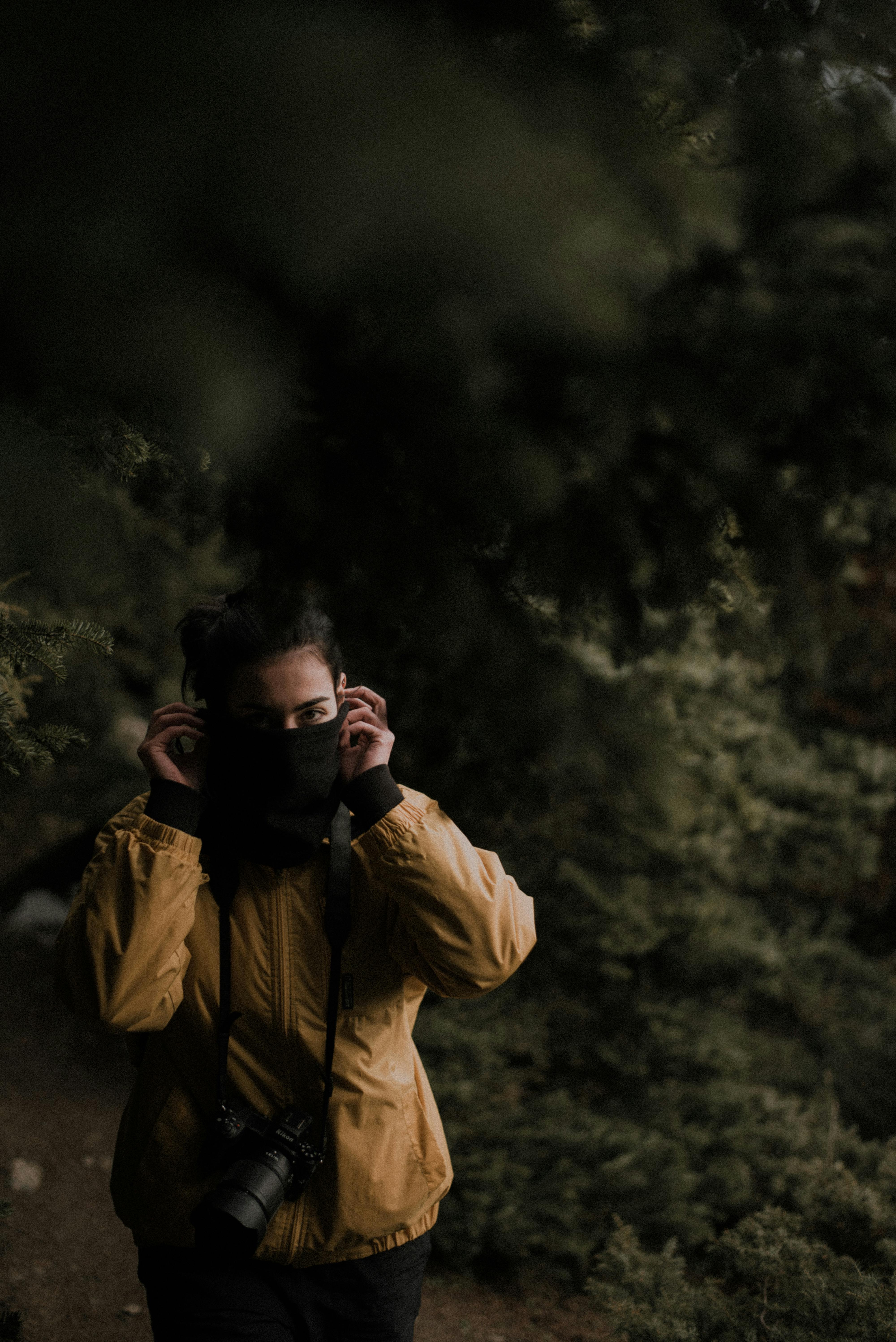 Woman Hiking in Jacket and Buff · Free Stock Photo