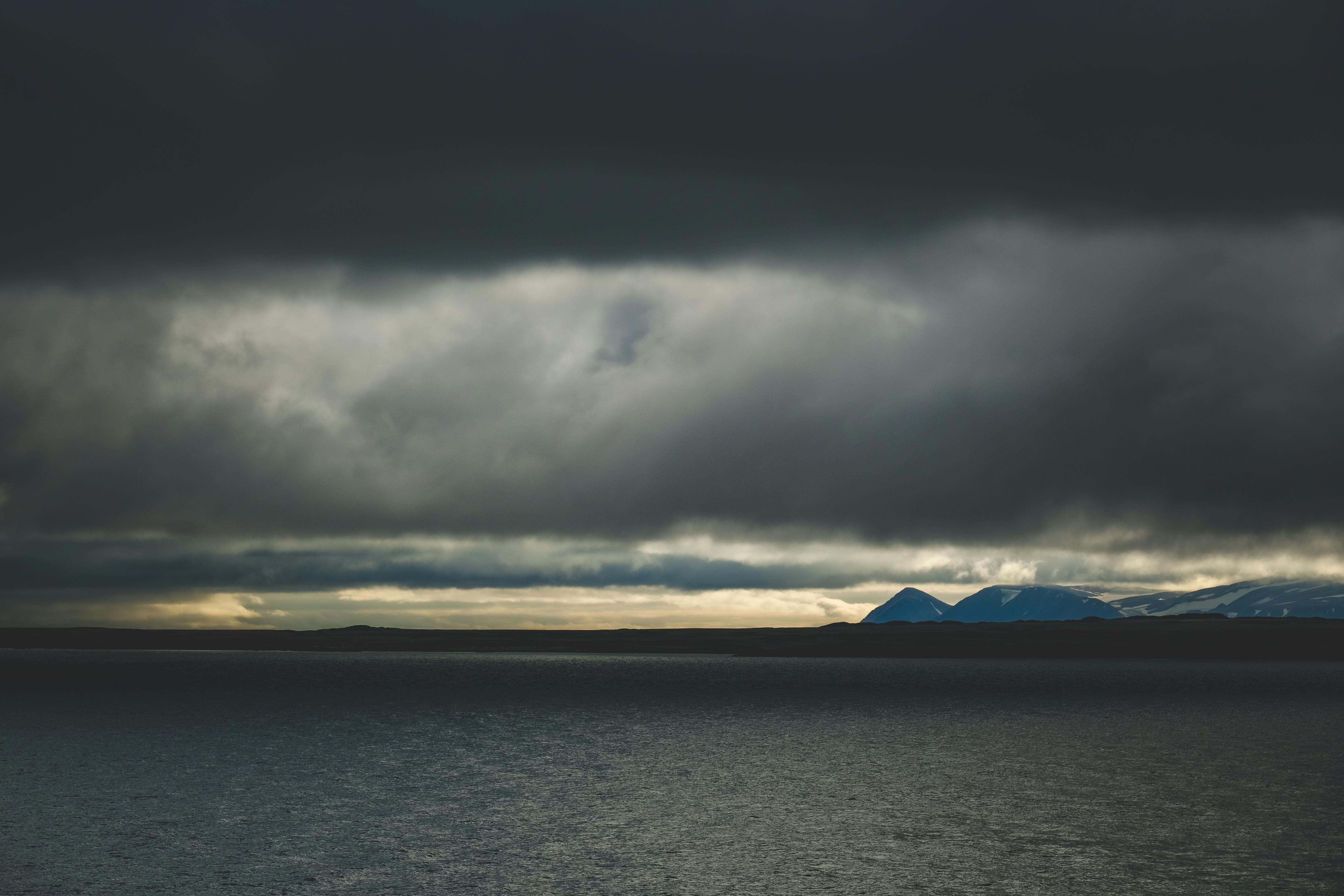 Overcast over Sea Coast · Free Stock Photo