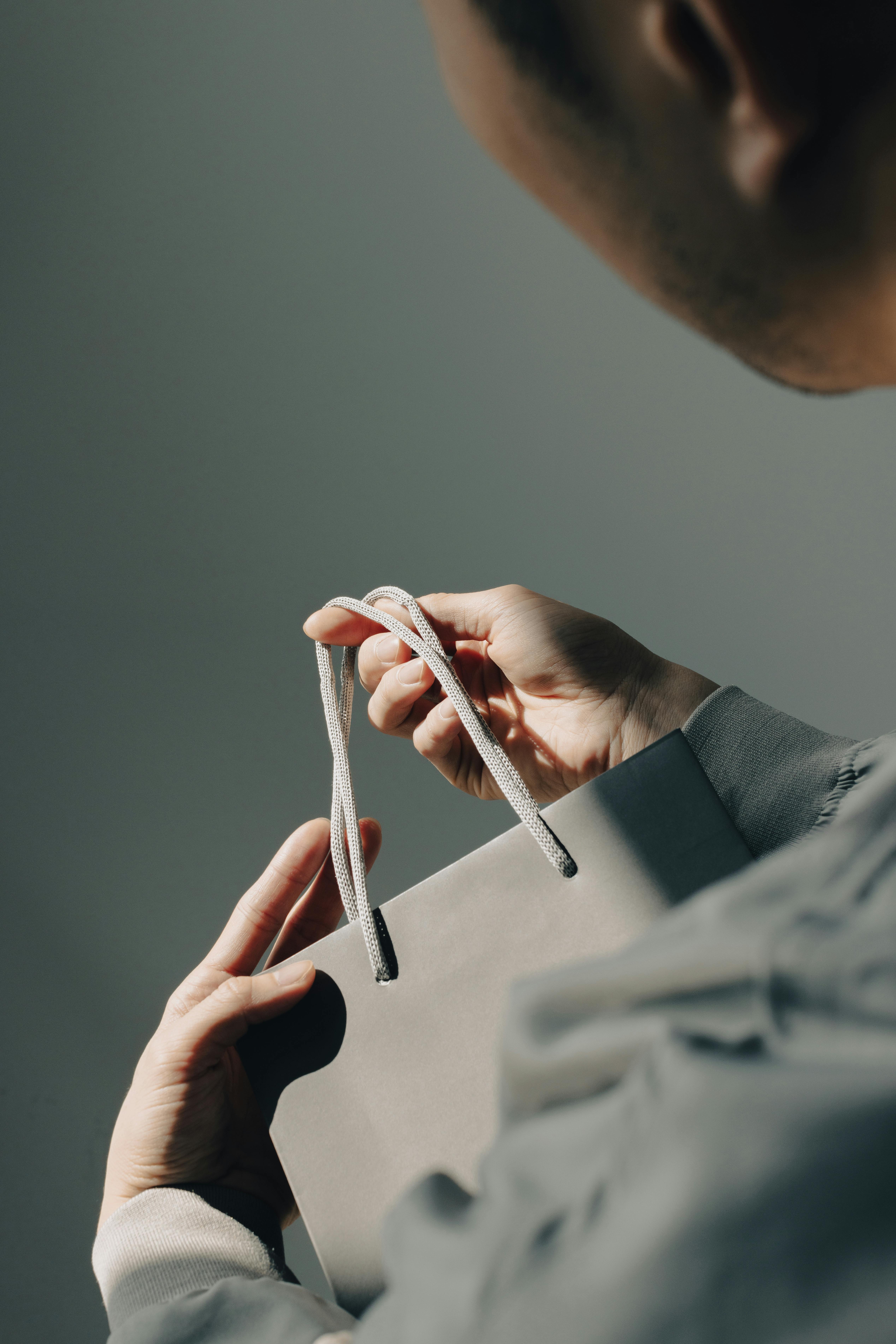 Person Hands Holding Paper Bag · Free Stock Photo