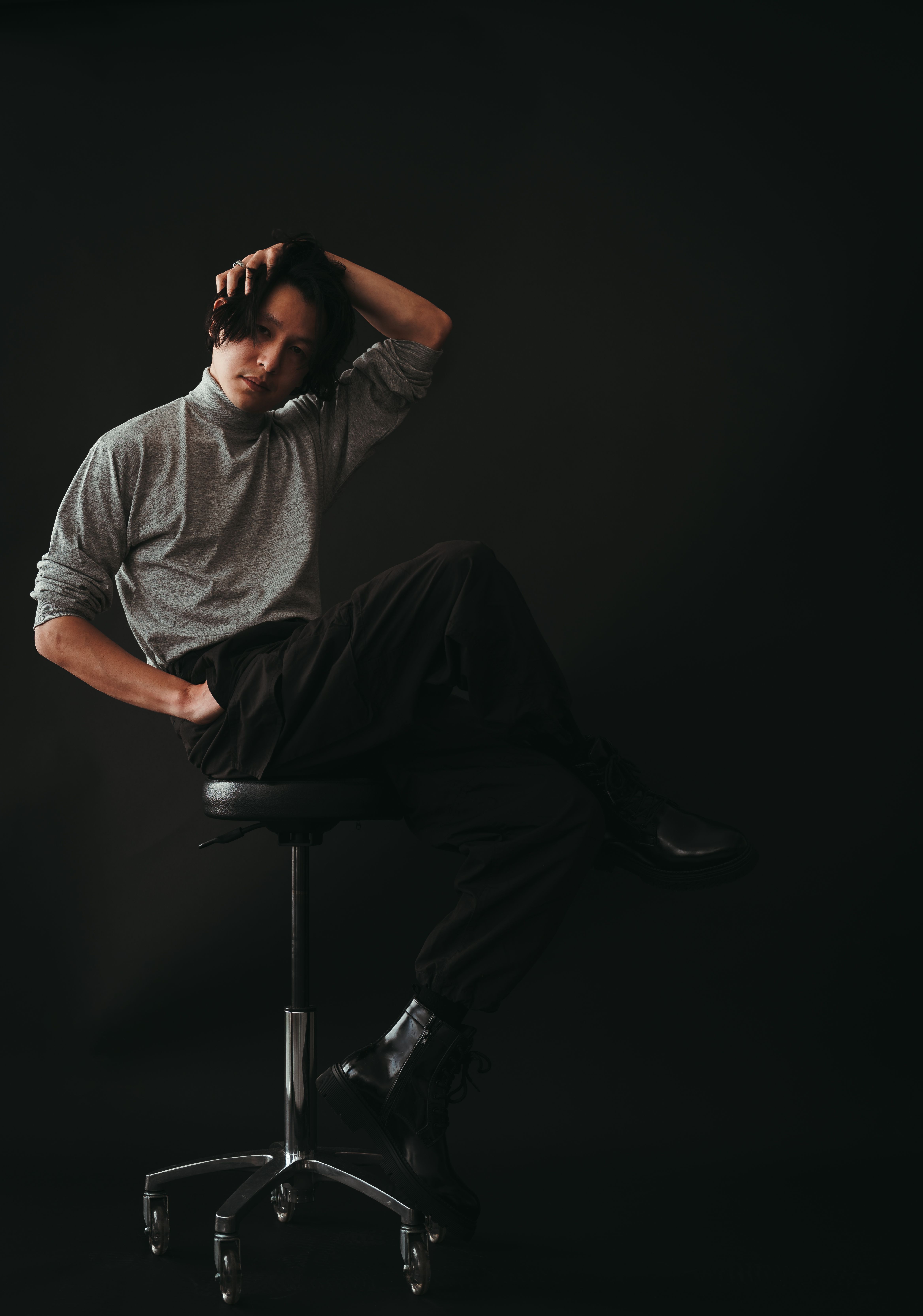 Man Sitting on Stool · Free Stock Photo