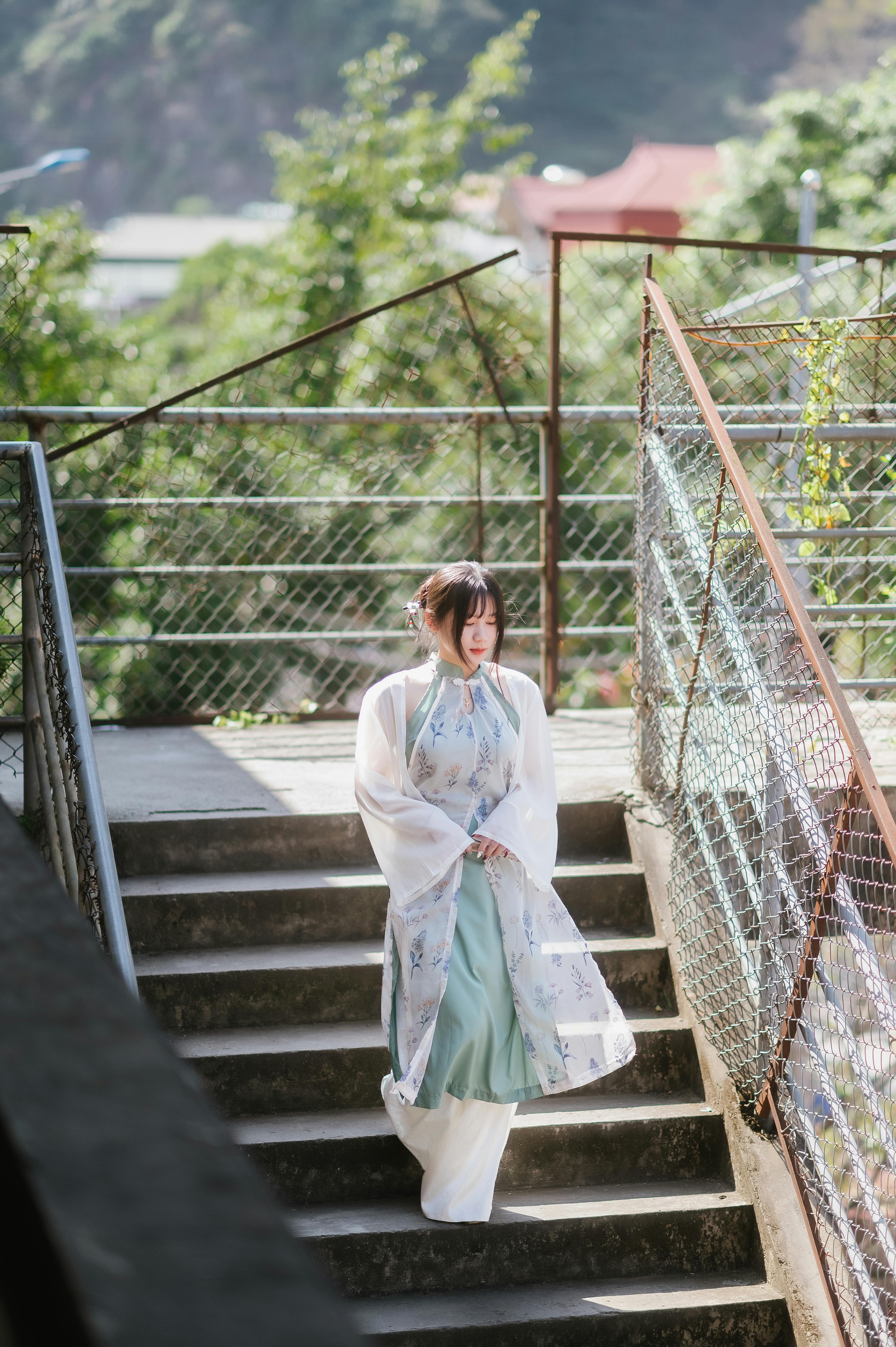 Woman Wearing Tulle Dress on Stairs · Free Stock Photo
