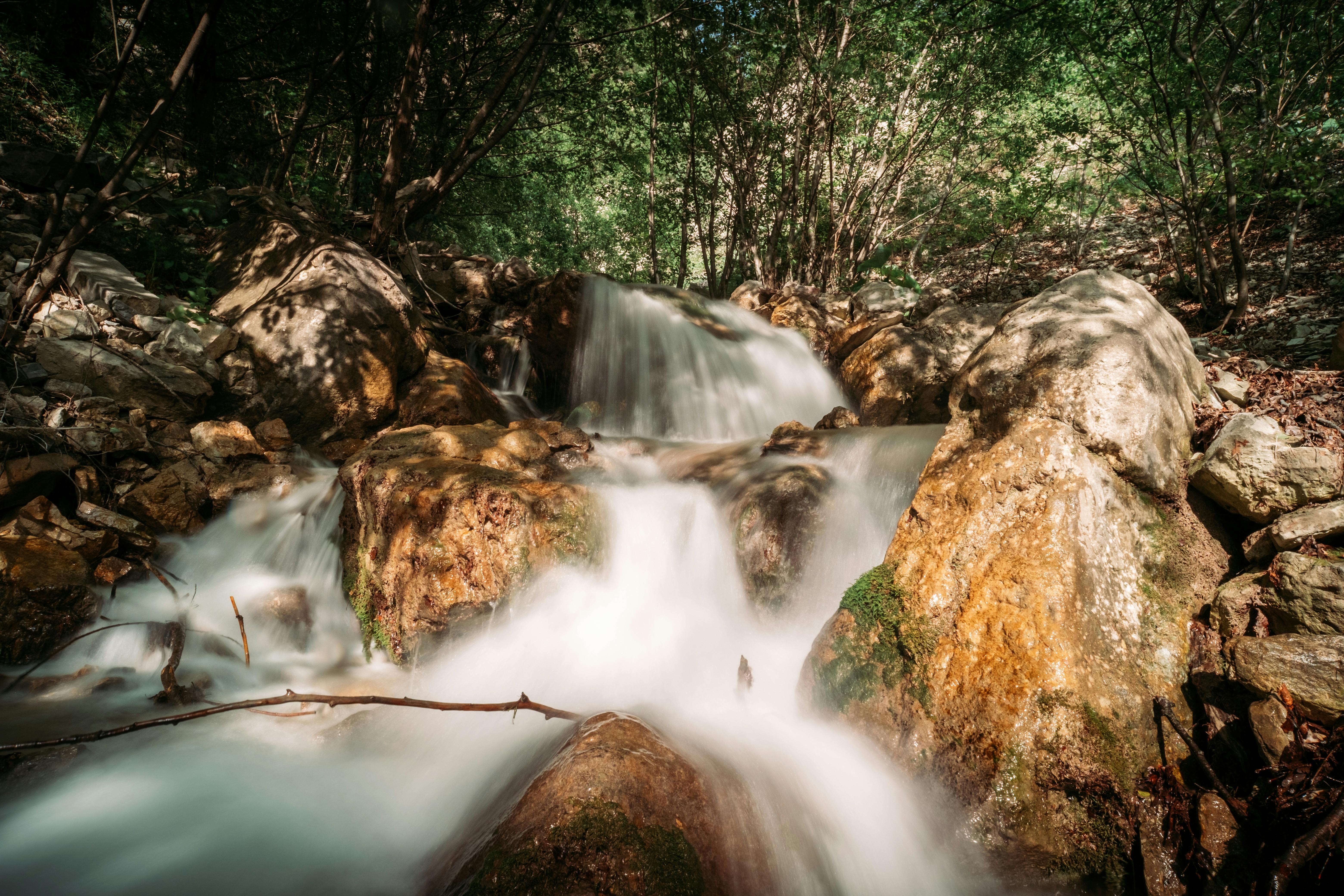 Waterfalls Beside Bridge · Free Stock Photo