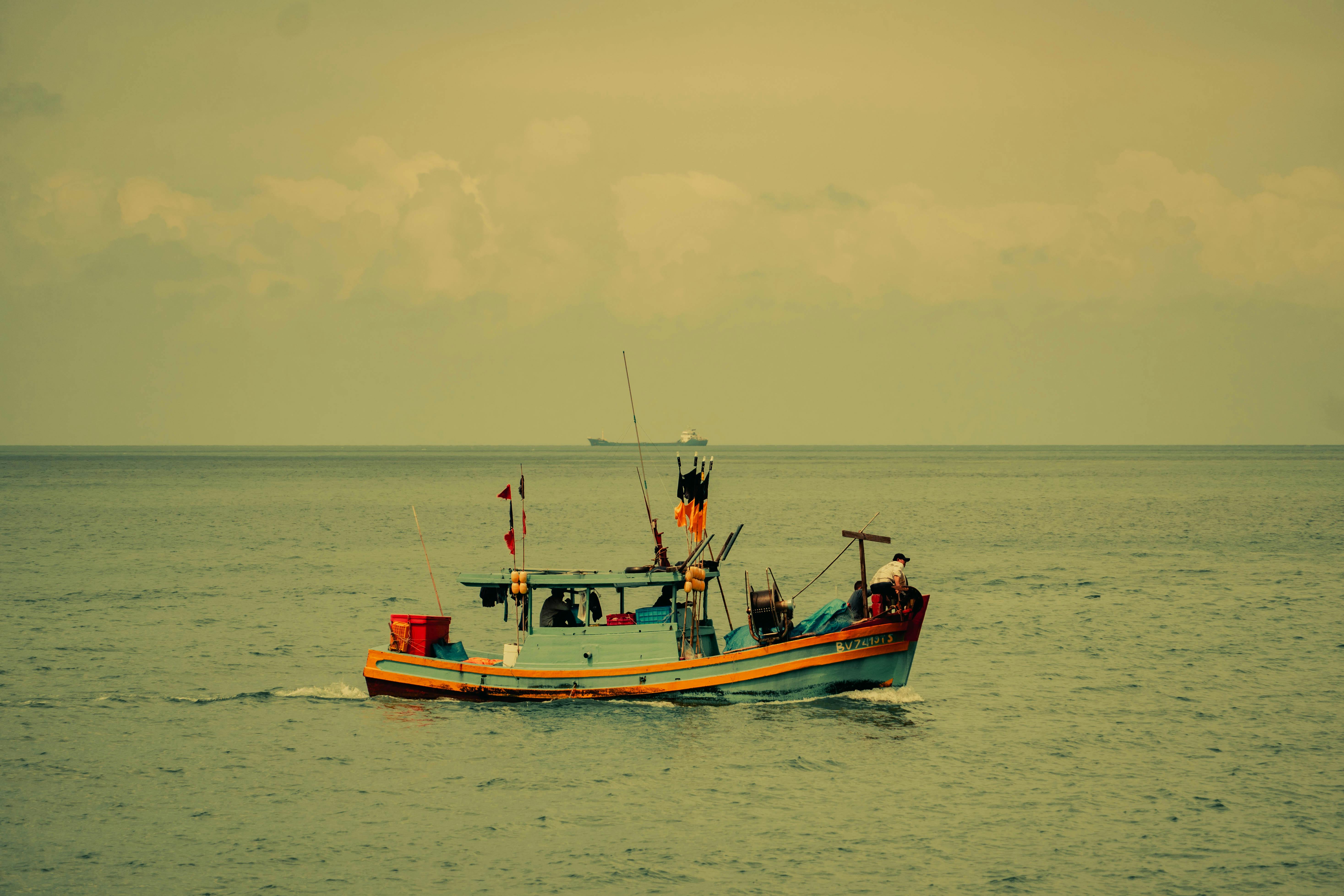 Fishing Boat at Sea · Free Stock Photo