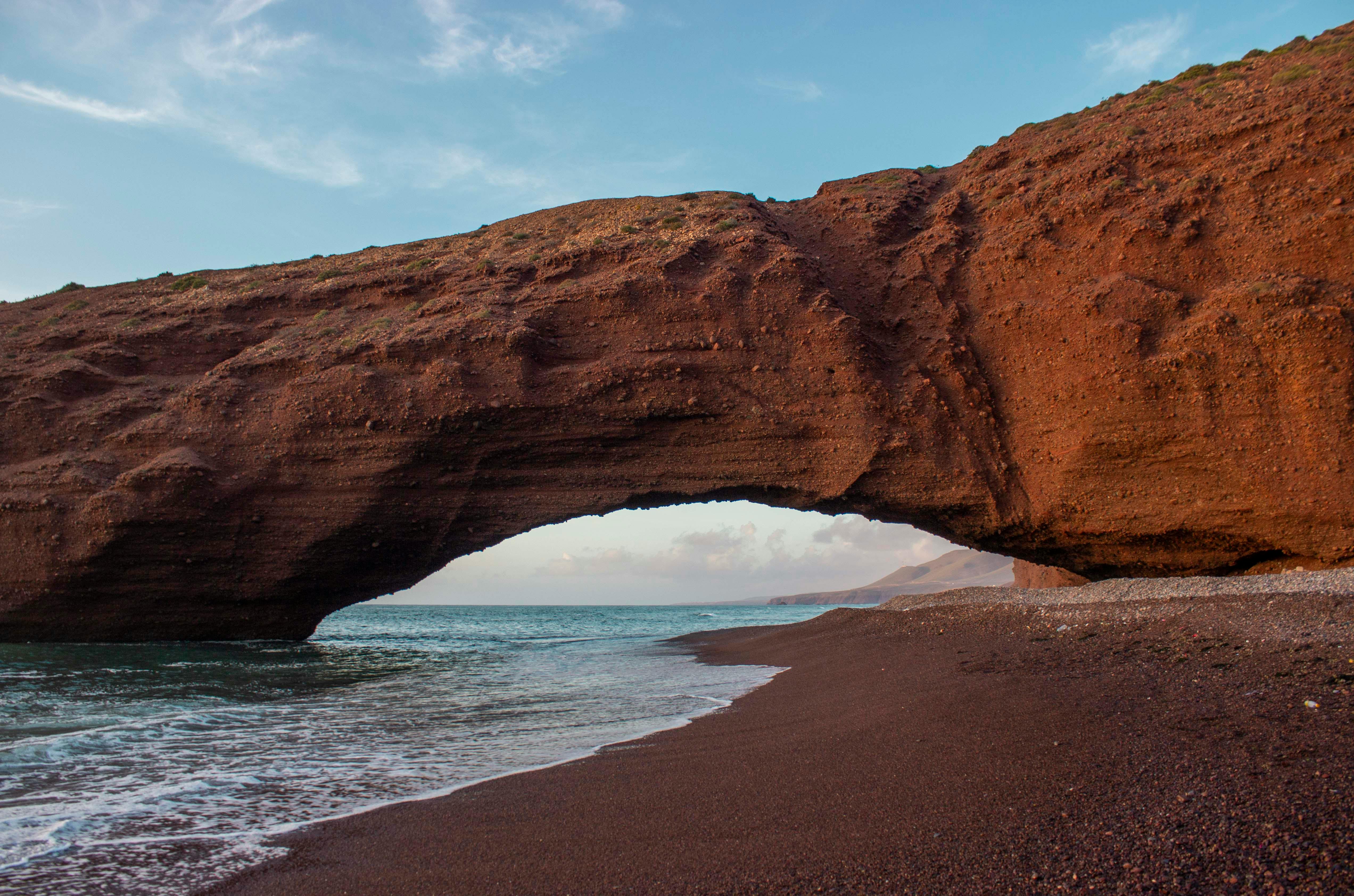 Natural Arch over a Sandy Beach · Free Stock Photo