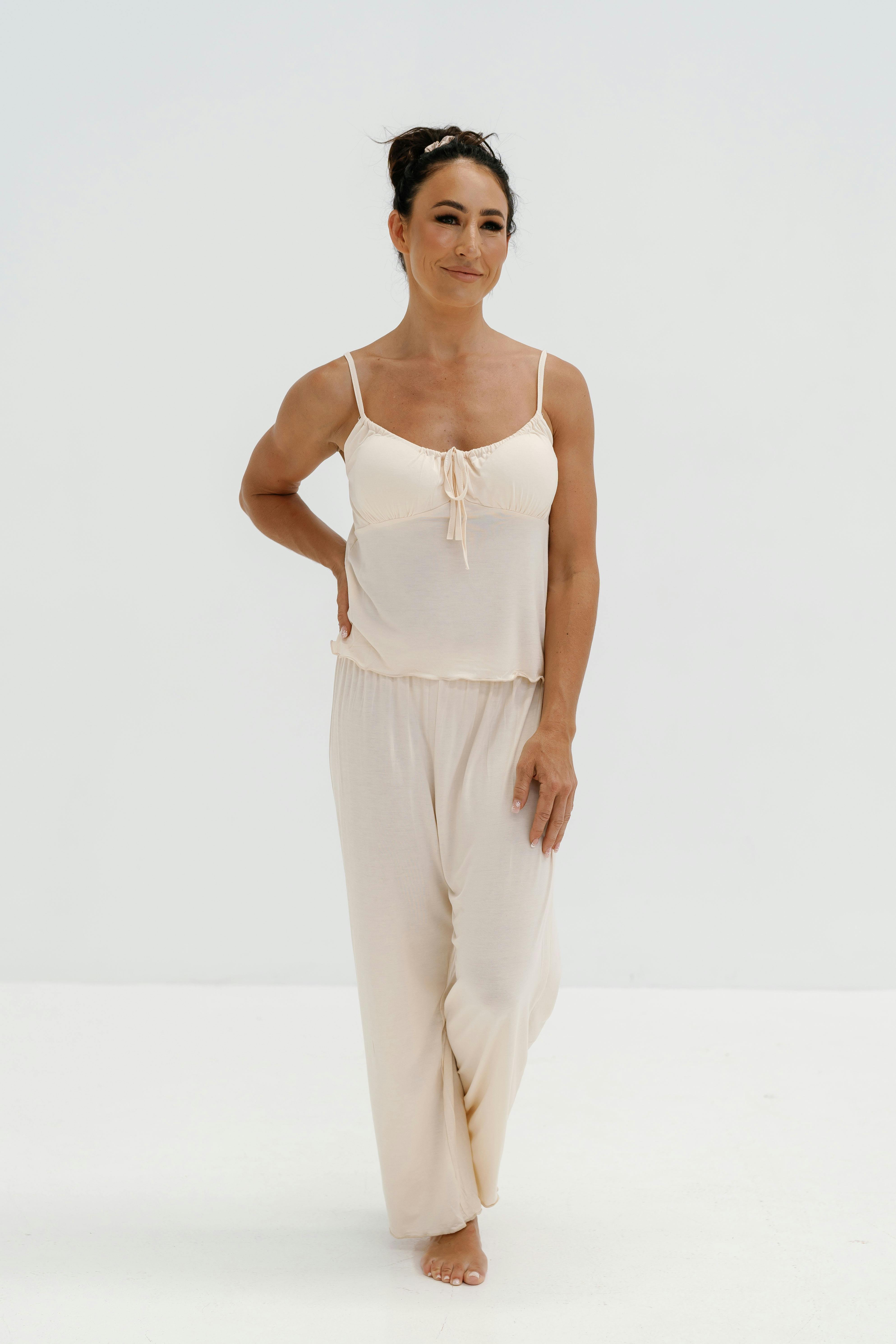 A Woman Sitting on Floor Hugging Leg · Free Stock Photo