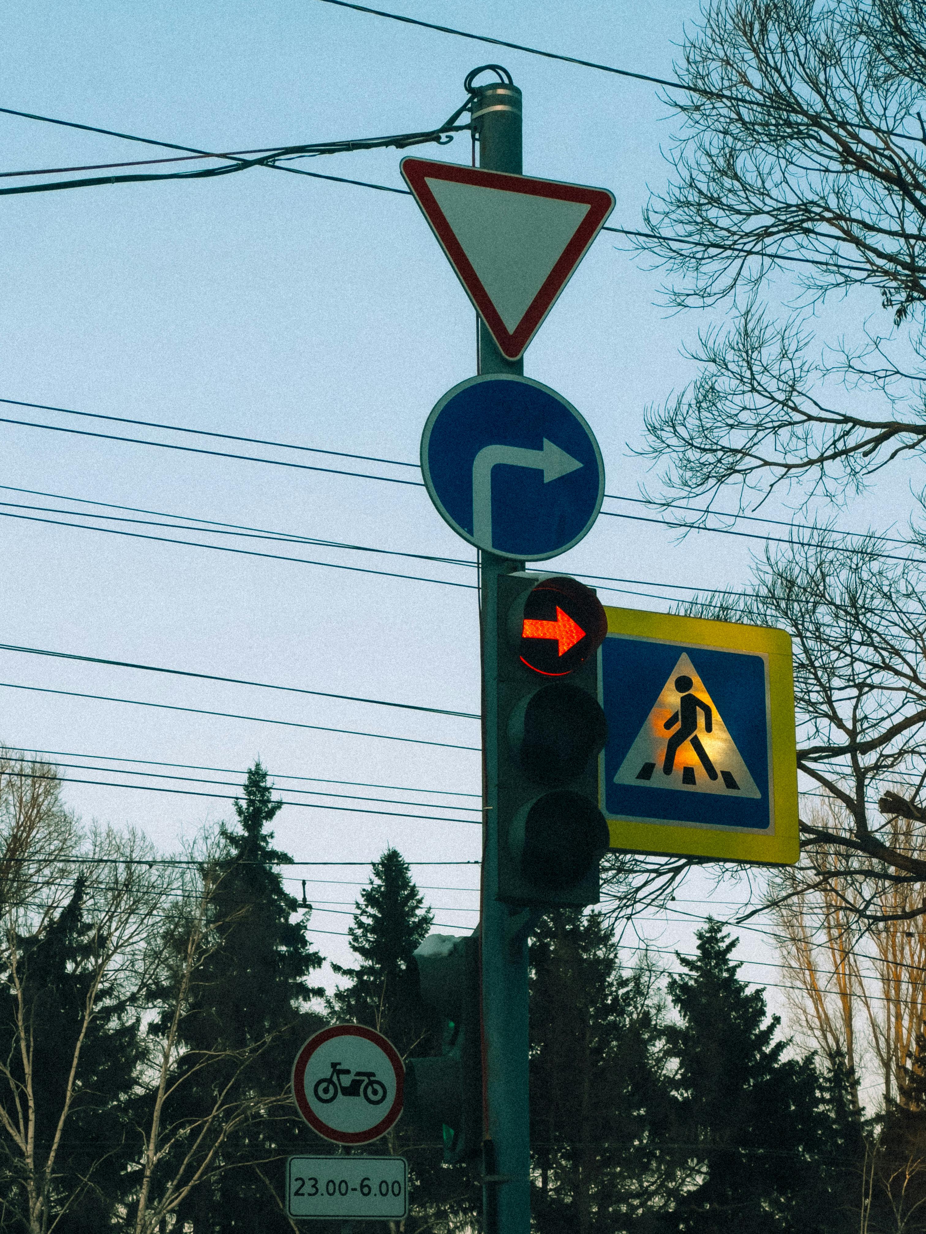 European Traffic Lights and Signs with Cables over Street · Free Stock ...