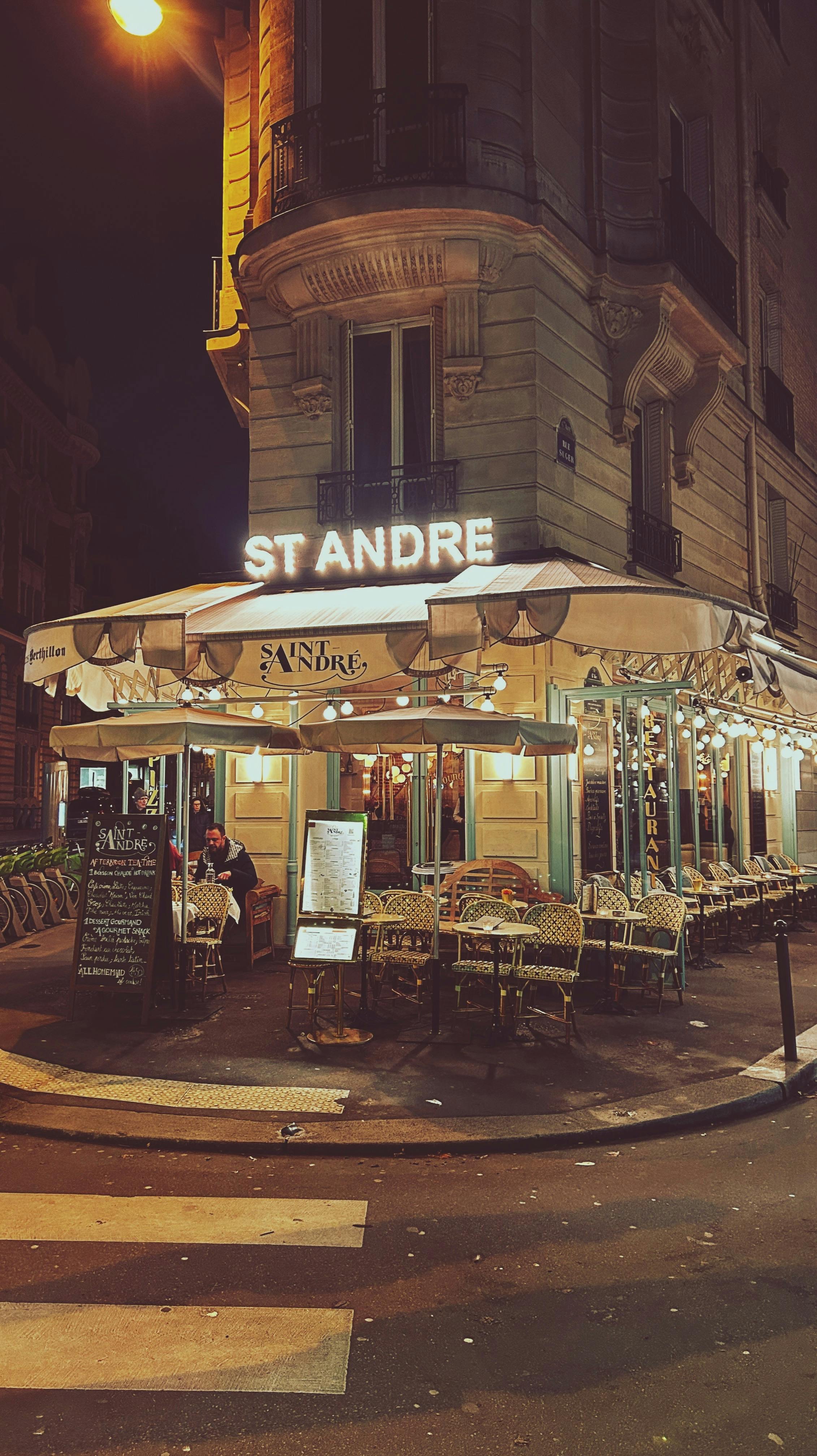 Neon Above the Windows of the Cafe at Night · Free Stock Photo