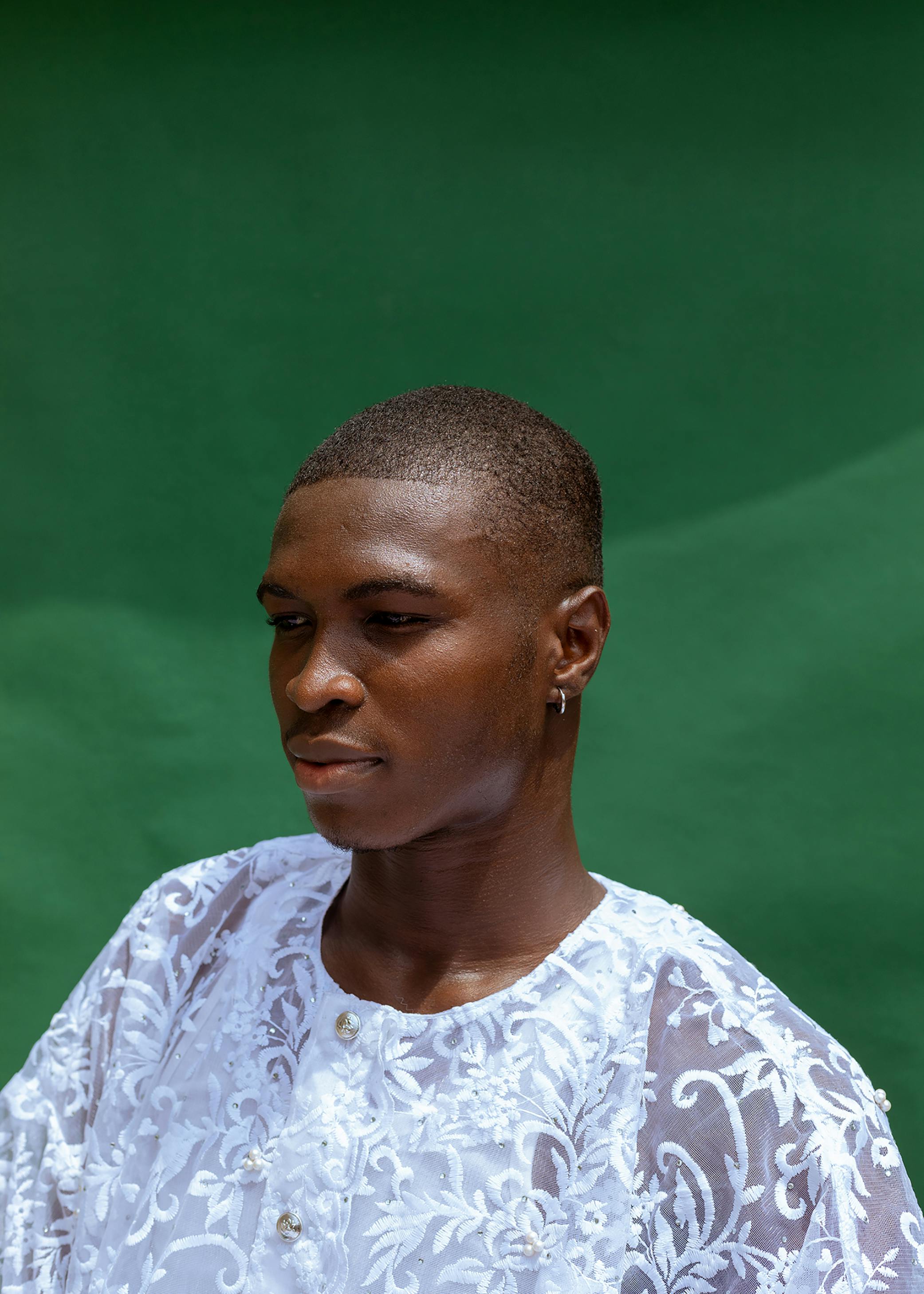 Portrait of Man on Green Background · Free Stock Photo