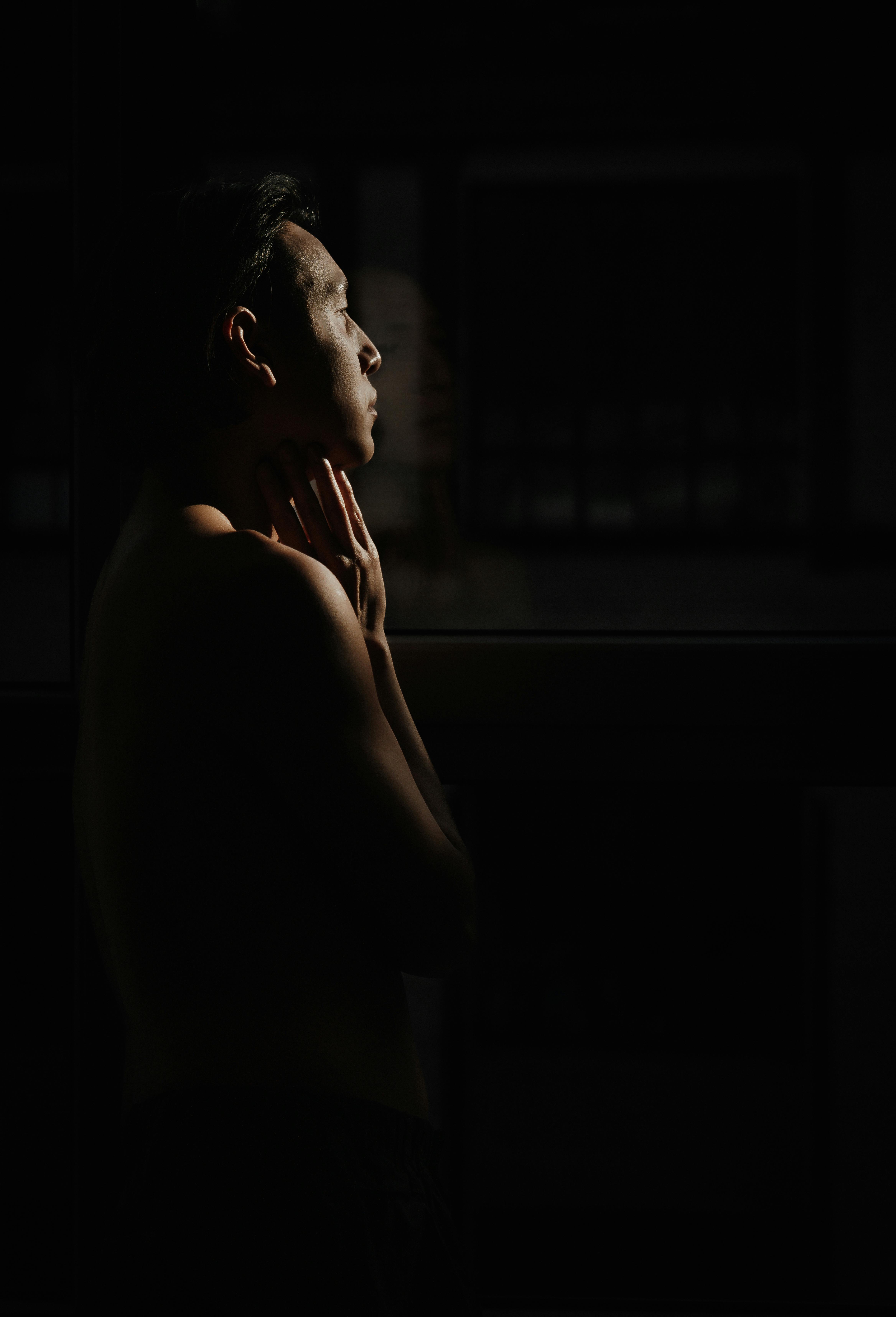Shirtless Man in the Darkness · Free Stock Photo