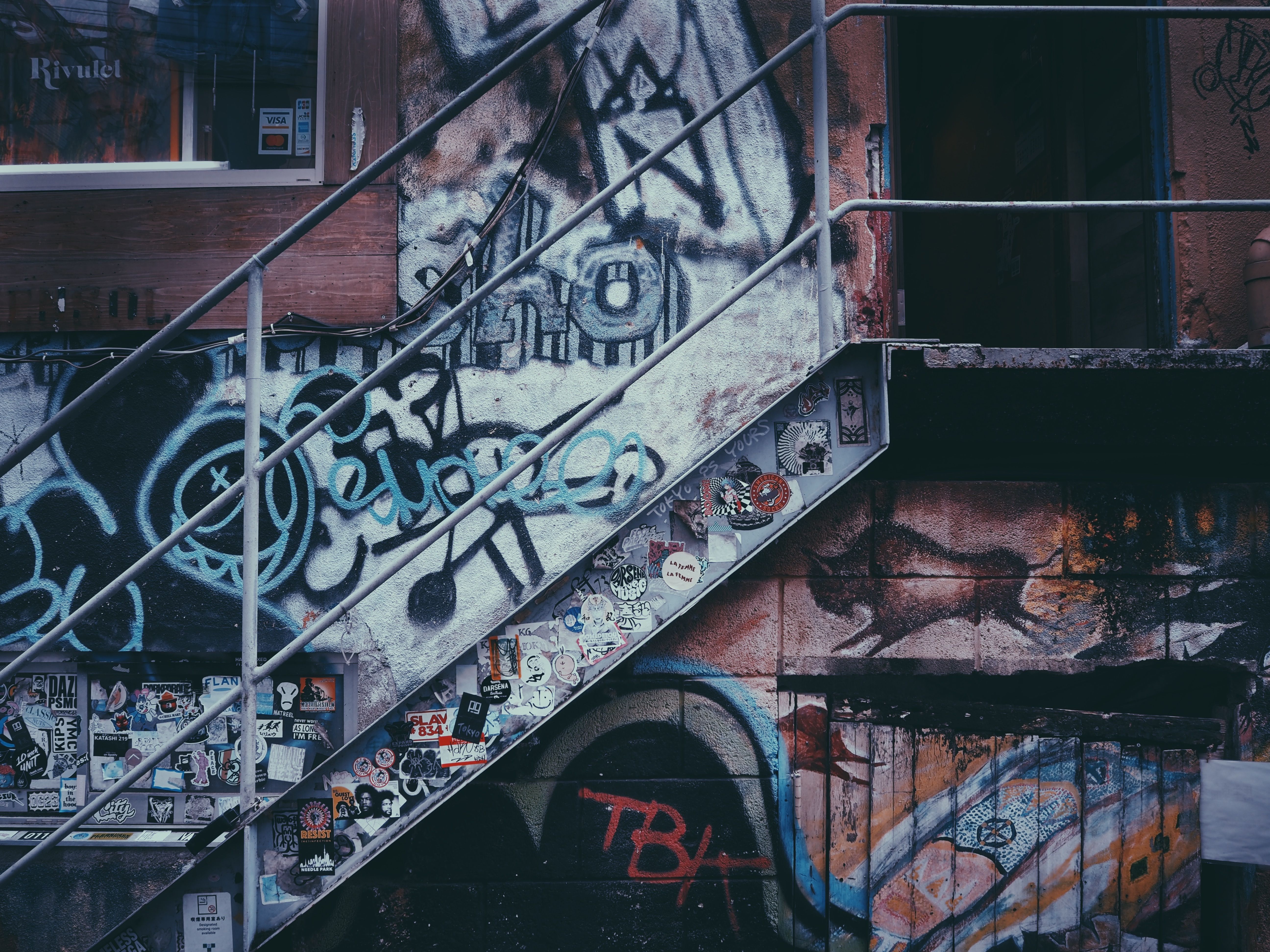 Graffiti and Tags on Building Wall · Free Stock Photo