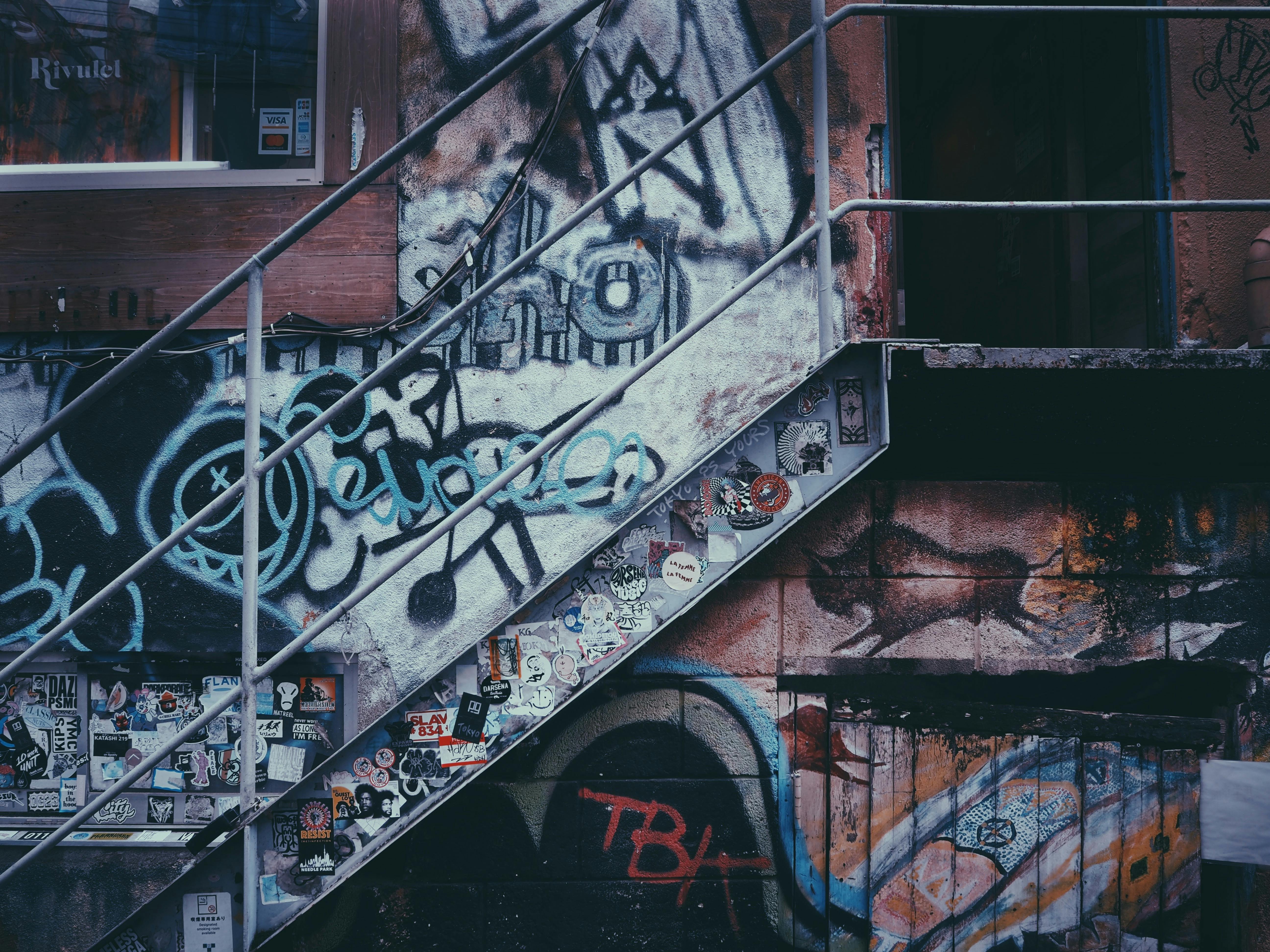 Graffiti and Tags on Building Wall · Free Stock Photo
