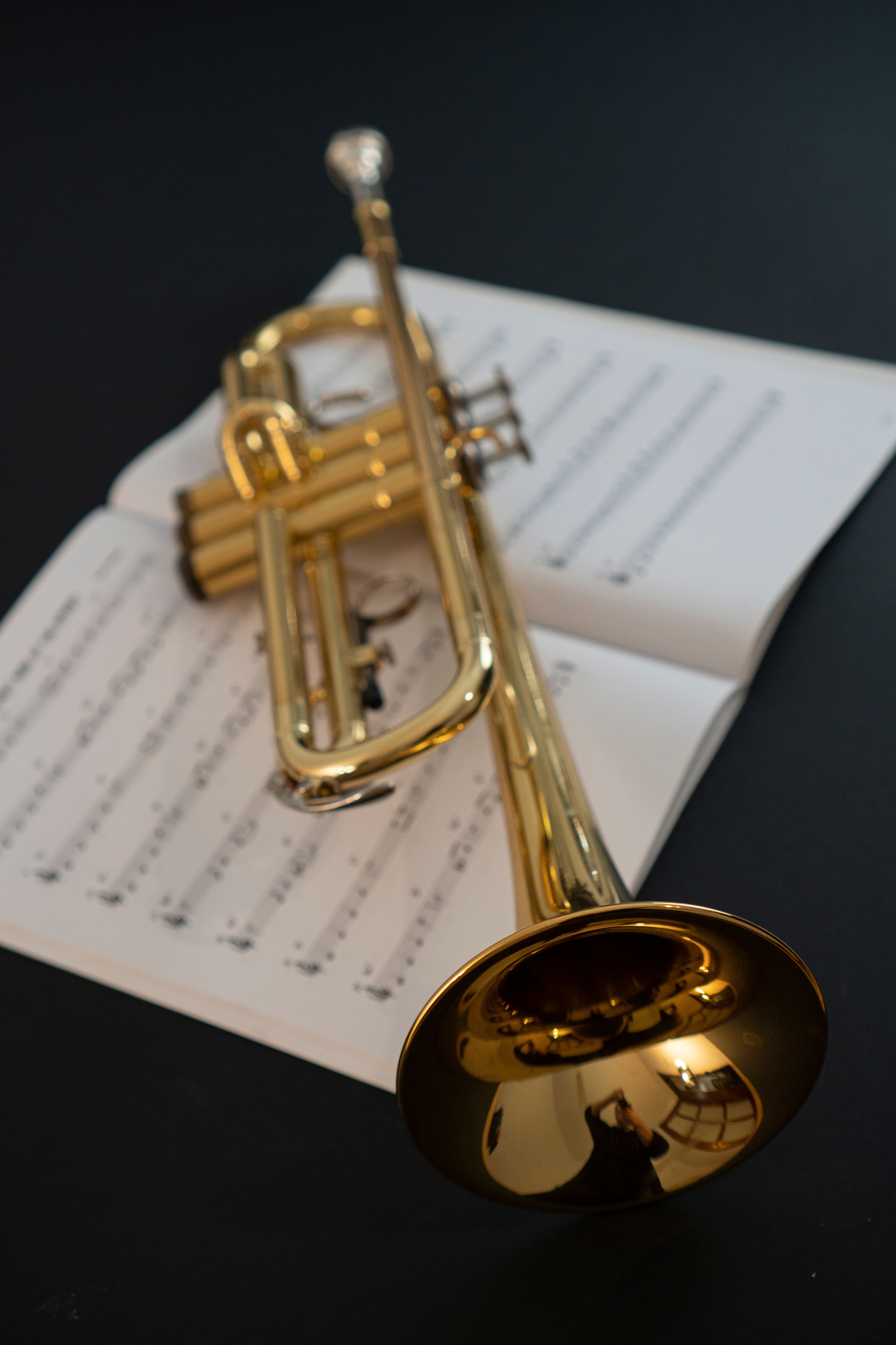 Trumpet on Book with Scores · Free Stock Photo