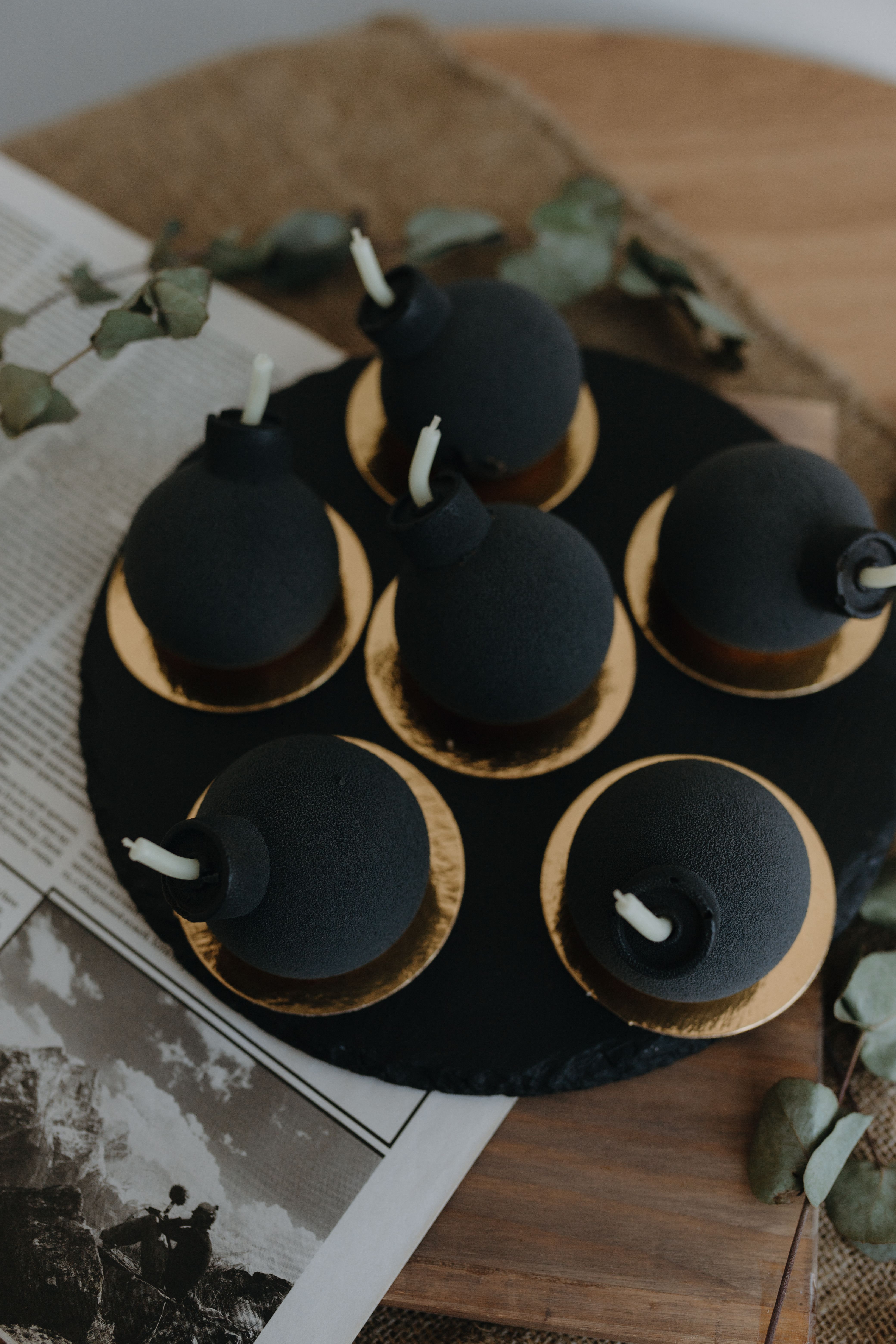 Cakes in Shape of Black Bomb on Tray · Free Stock Photo