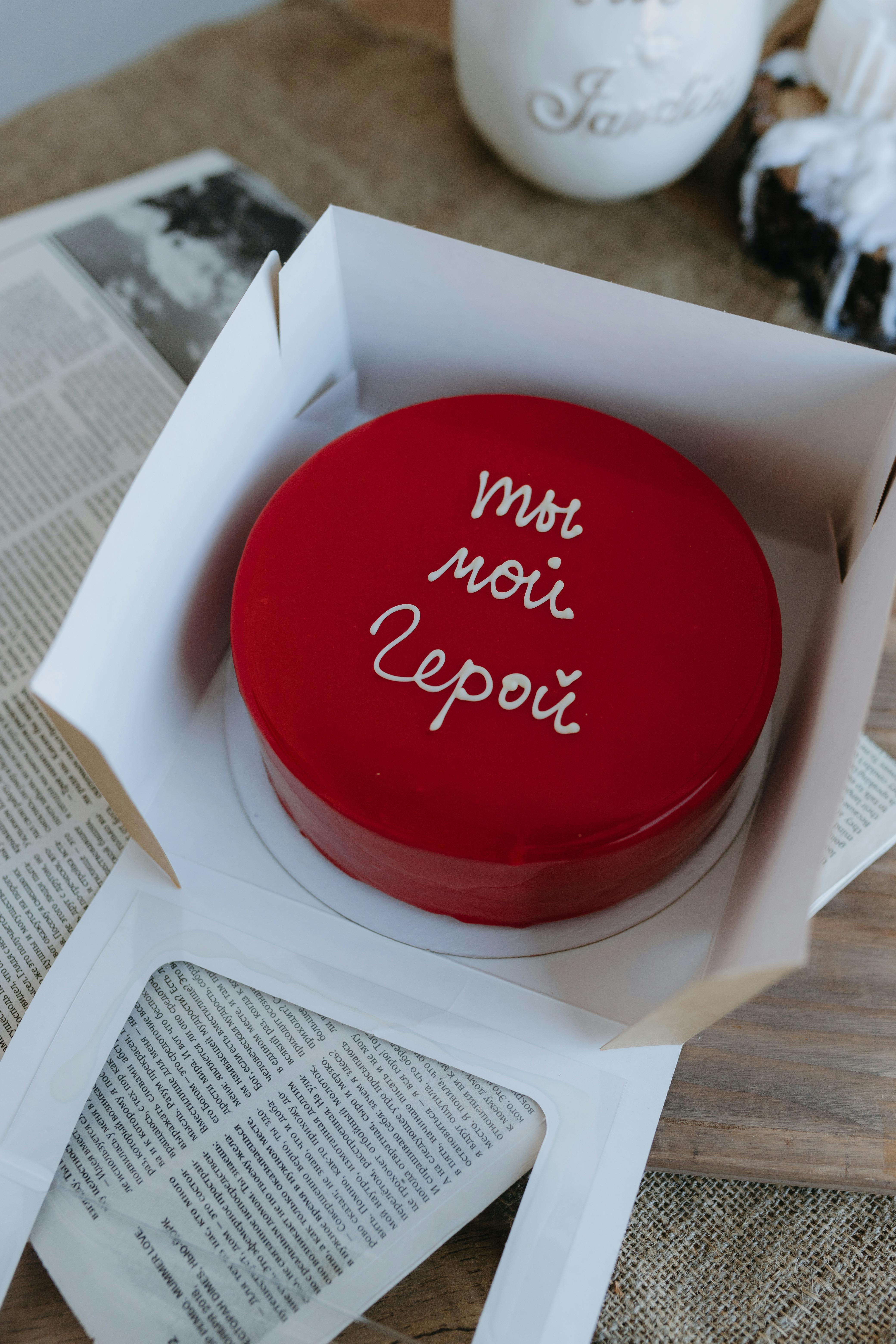 Cake with Red Icing with Script on its Top · Free Stock Photo