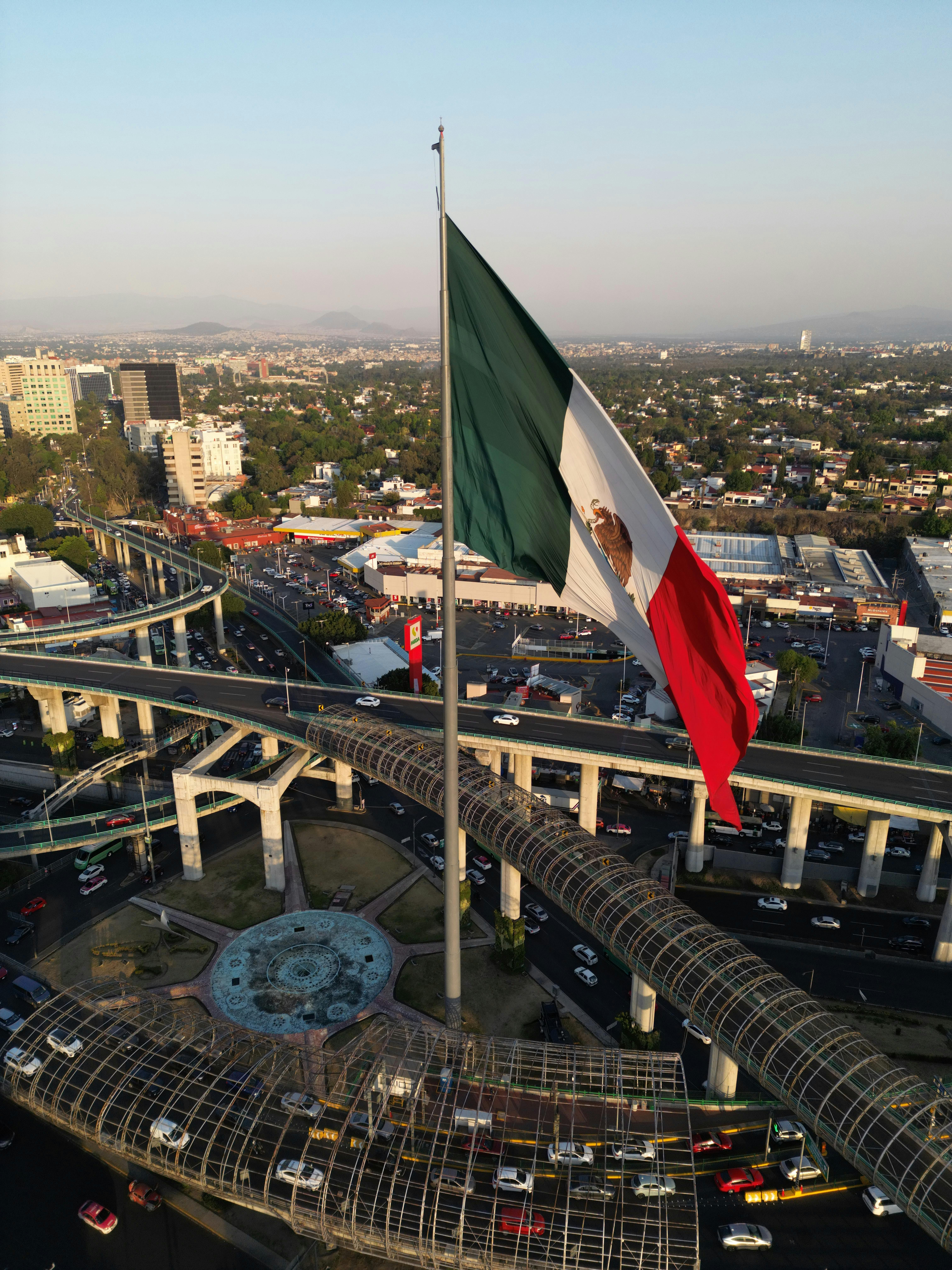 Flag of Mexico over Mexico City · Free Stock Photo