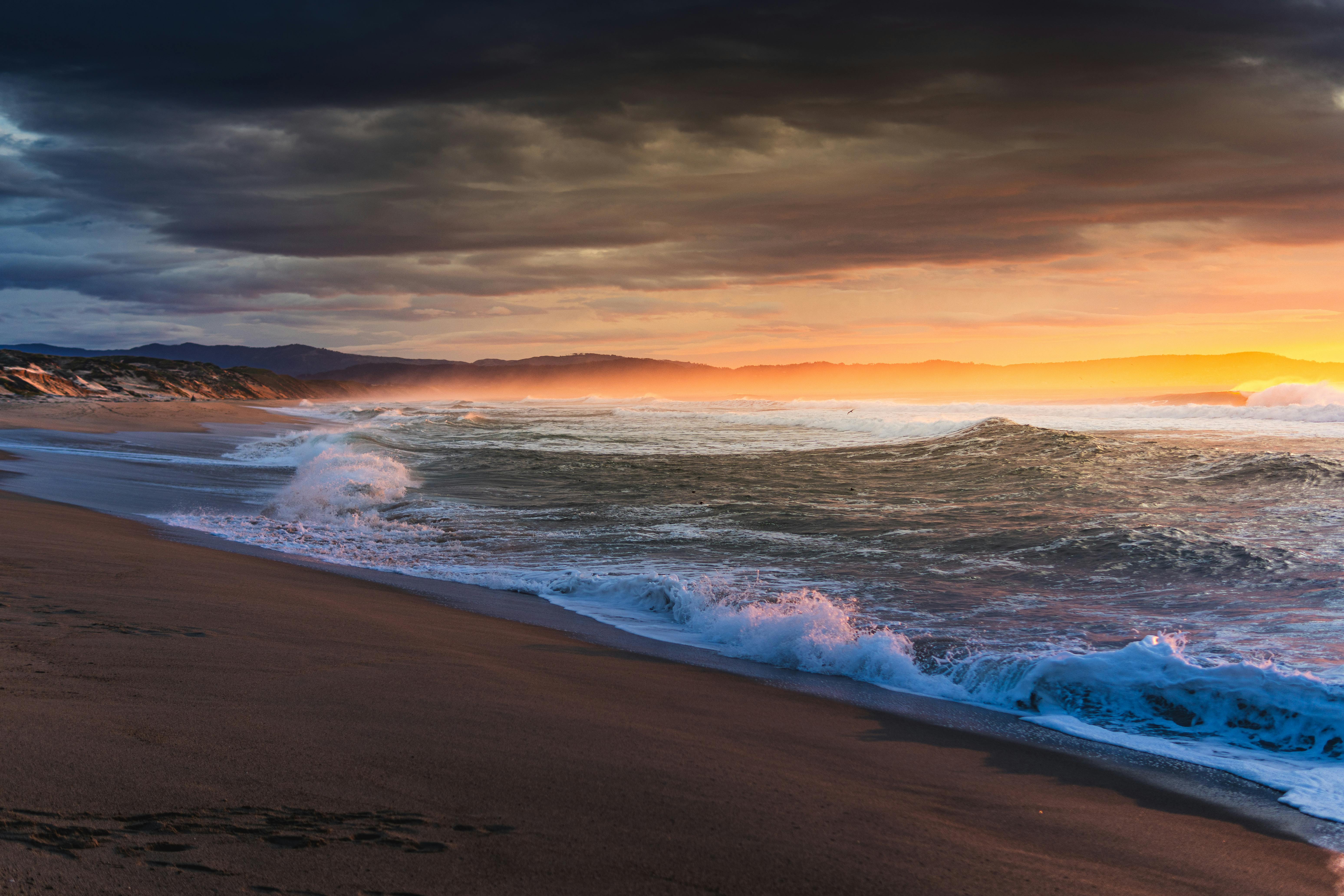 Ocean Water during Yellow Sunset · Free Stock Photo