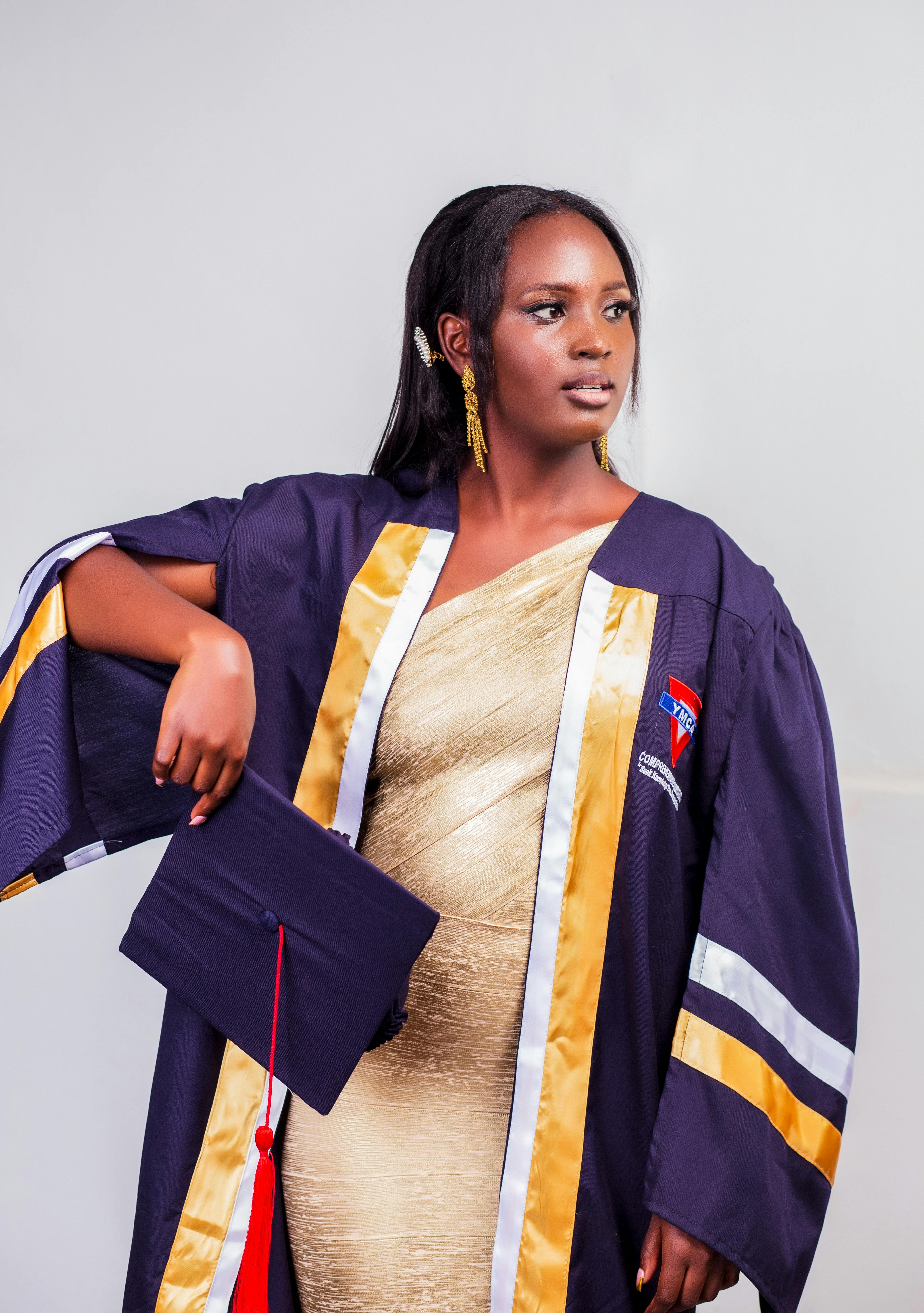 Woman Wearing College Regalia Over Her Dress · Free Stock Photo