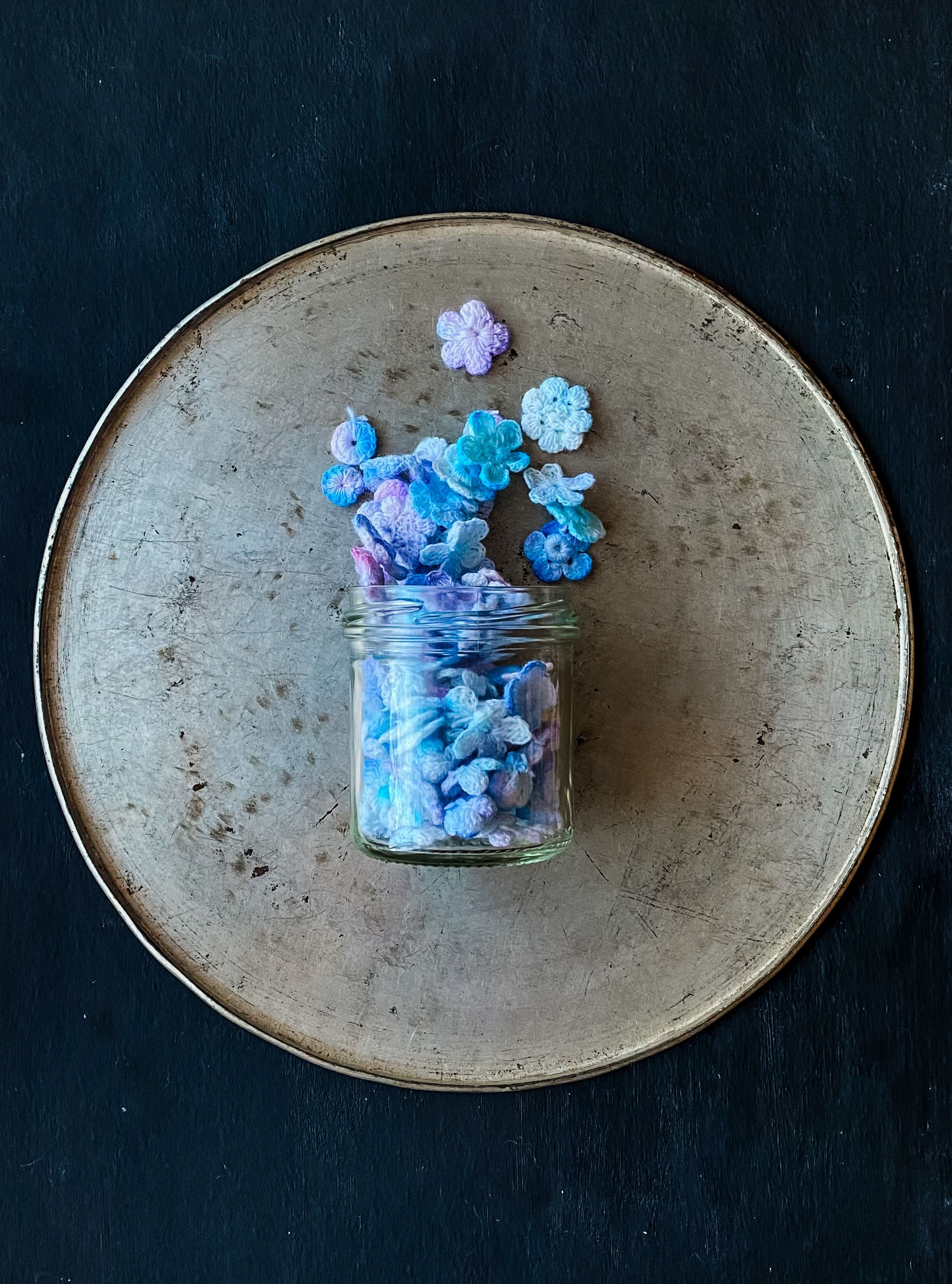 Photo of Rainbow Colored Flower in Glass Jar · Free Stock Photo